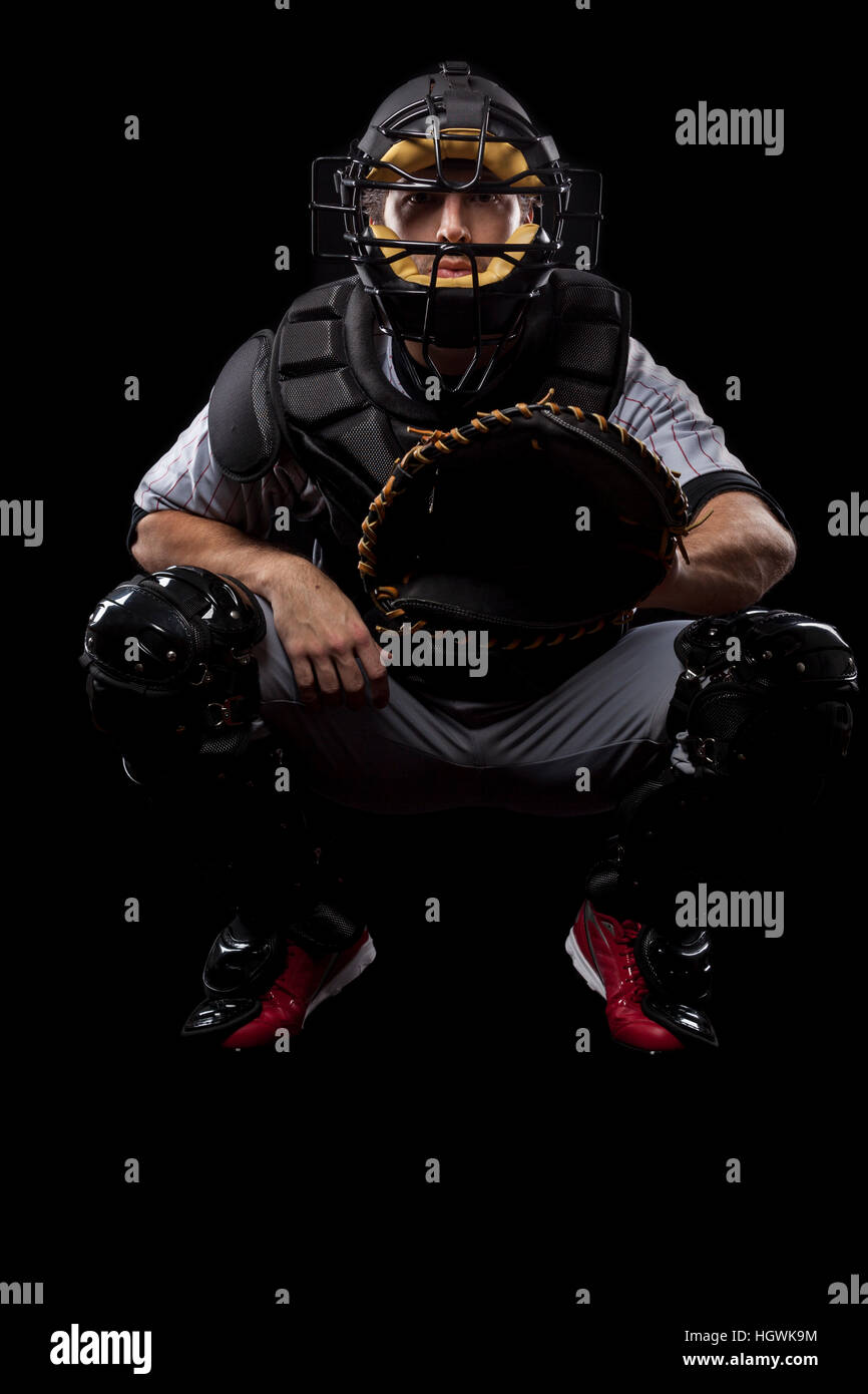 Baseball Player, catcher waiting a ball, on a black background. Studio ...