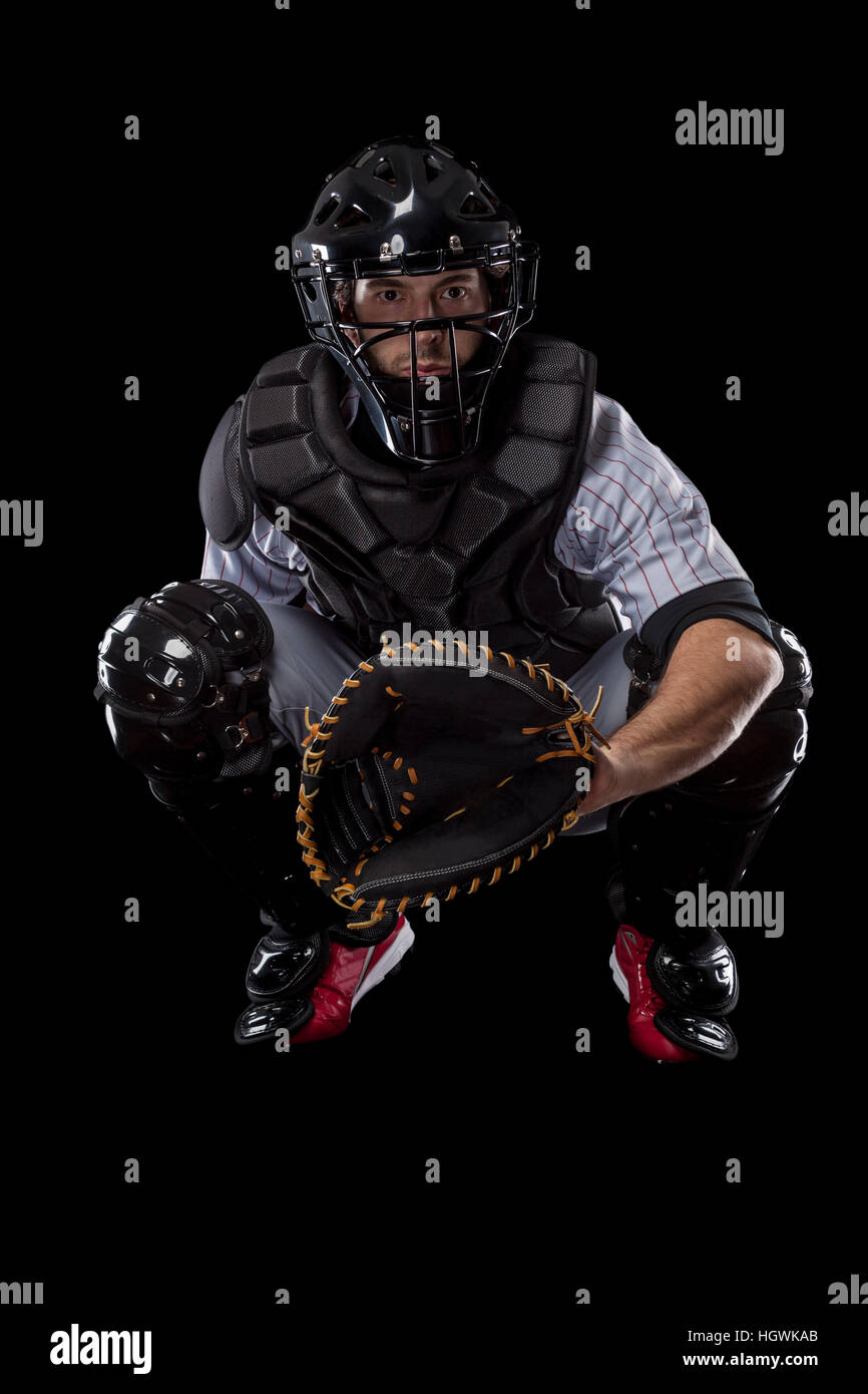 Baseball Player, catcher waiting a ball, on a black background. Studio ...