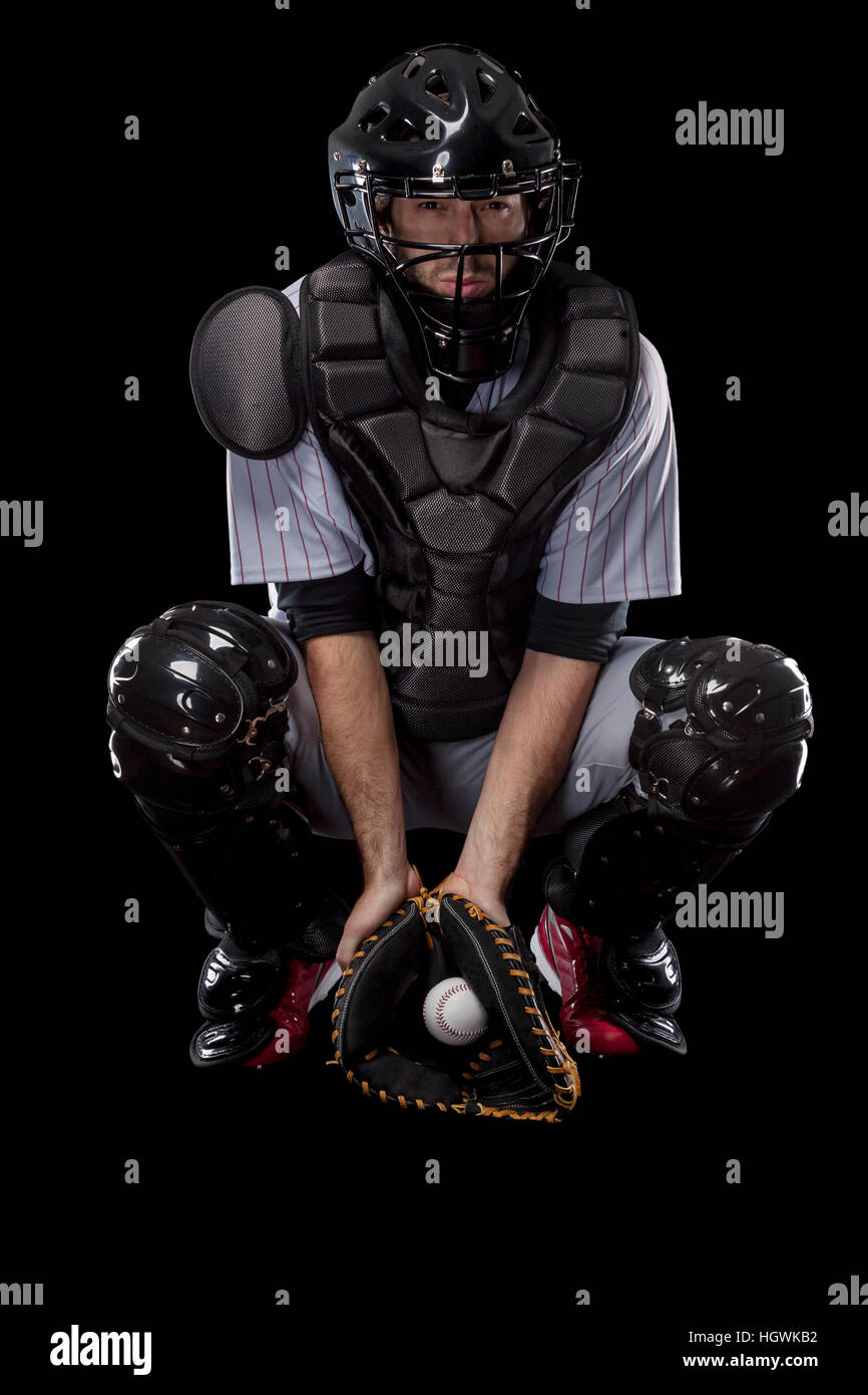 Baseball Player, catcher catching a wild pitch, on a black background ...