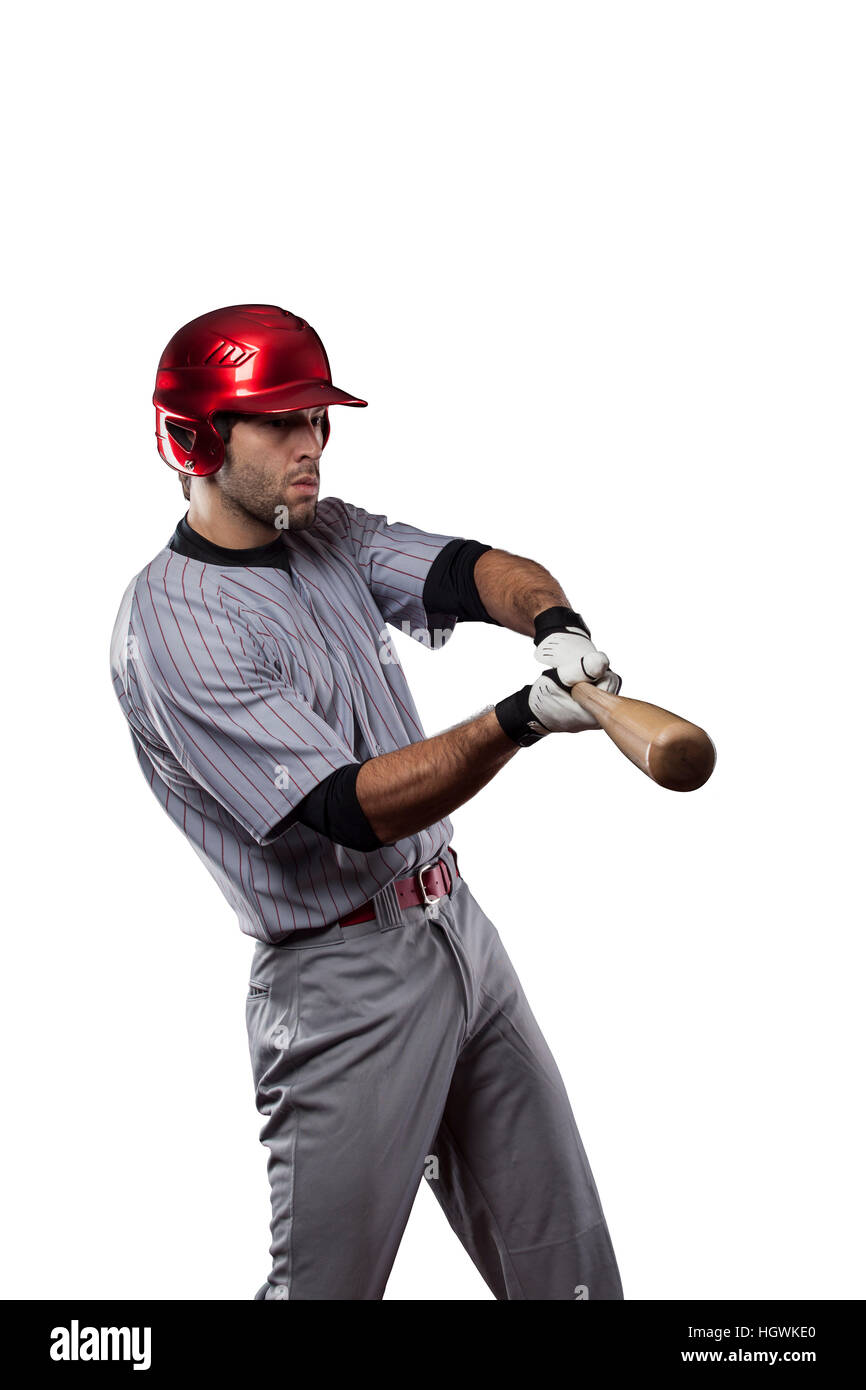 Baseball Player in red uniform, on a white background Stock Photo - Alamy
