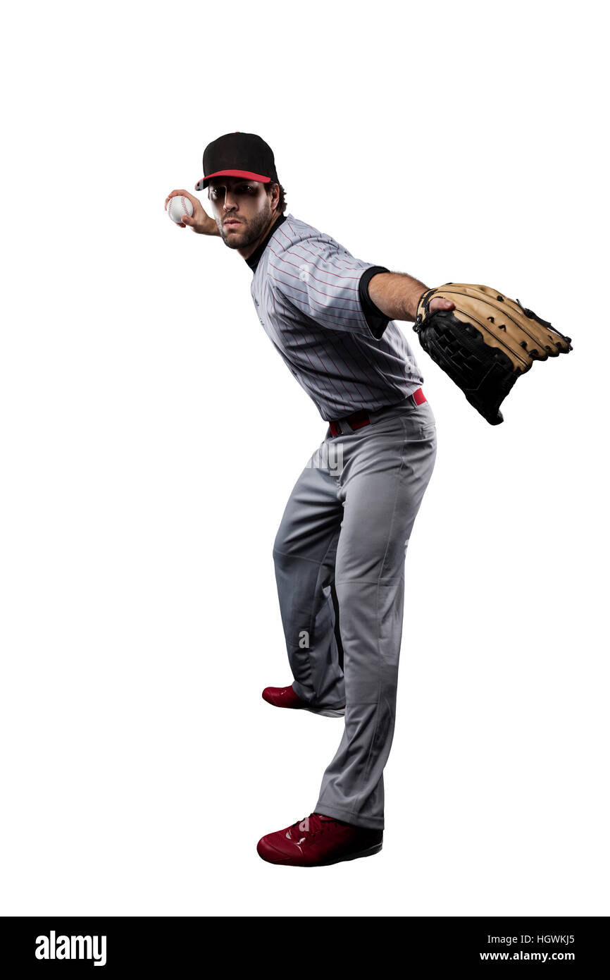 Baseball Player in red uniform, on a white background Stock Photo - Alamy