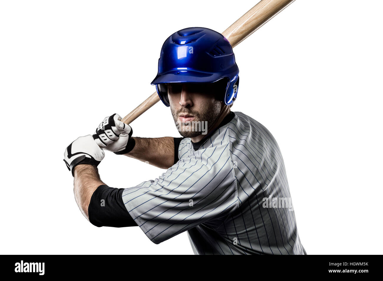 Baseball Player in a blue uniform, on a white background Stock Photo ...