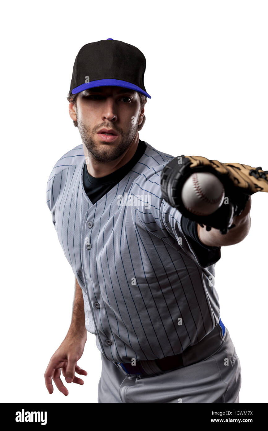 Baseball Player in a blue uniform, on a white background Stock Photo ...