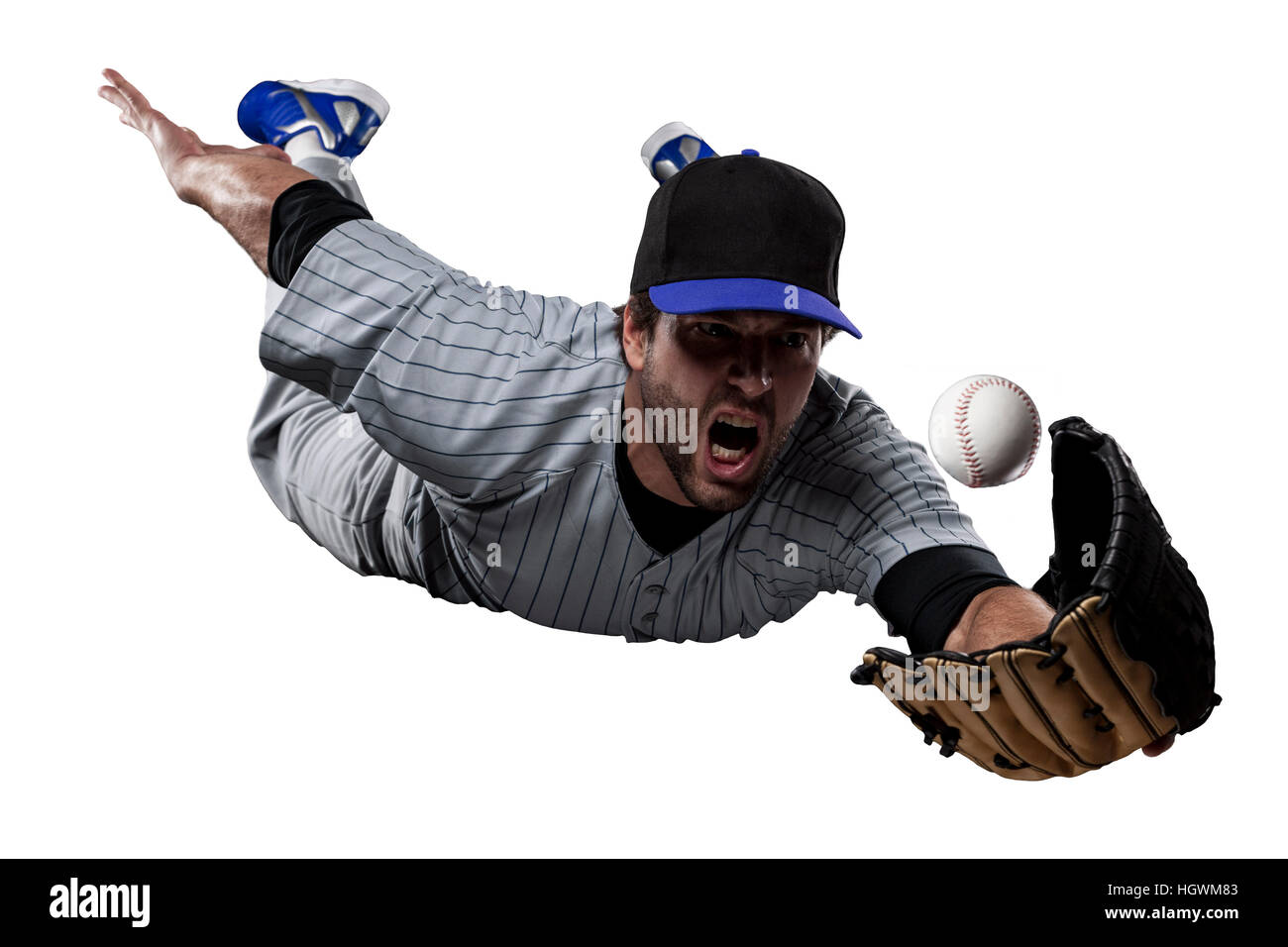 Baseball Player in a blue uniform, on a white background Stock Photo ...
