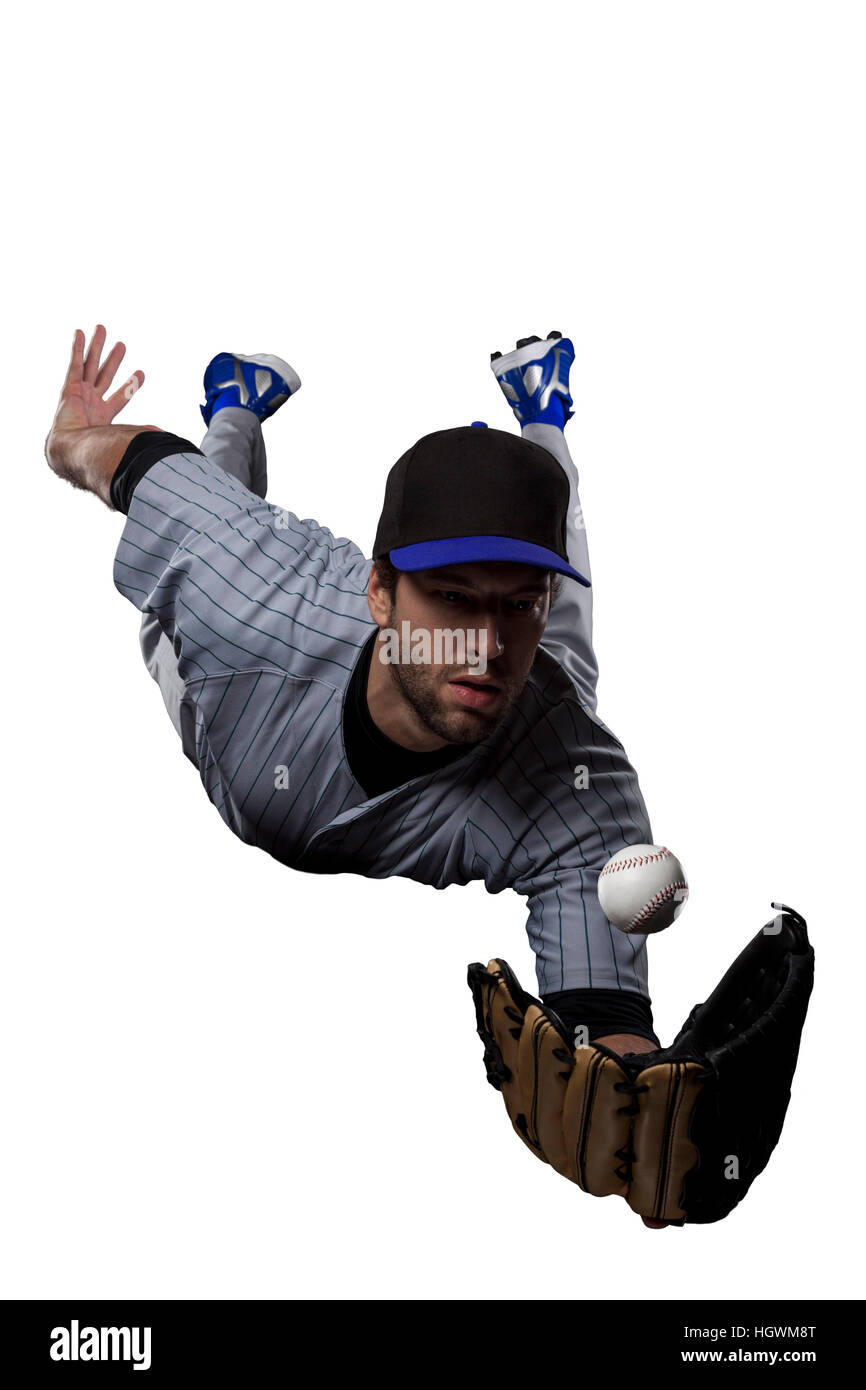 Baseball Player in a blue uniform, on a white background Stock Photo ...