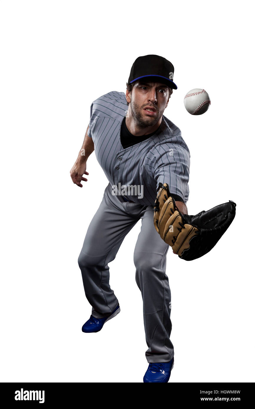 Baseball Player in a blue uniform, on a white background Stock Photo ...