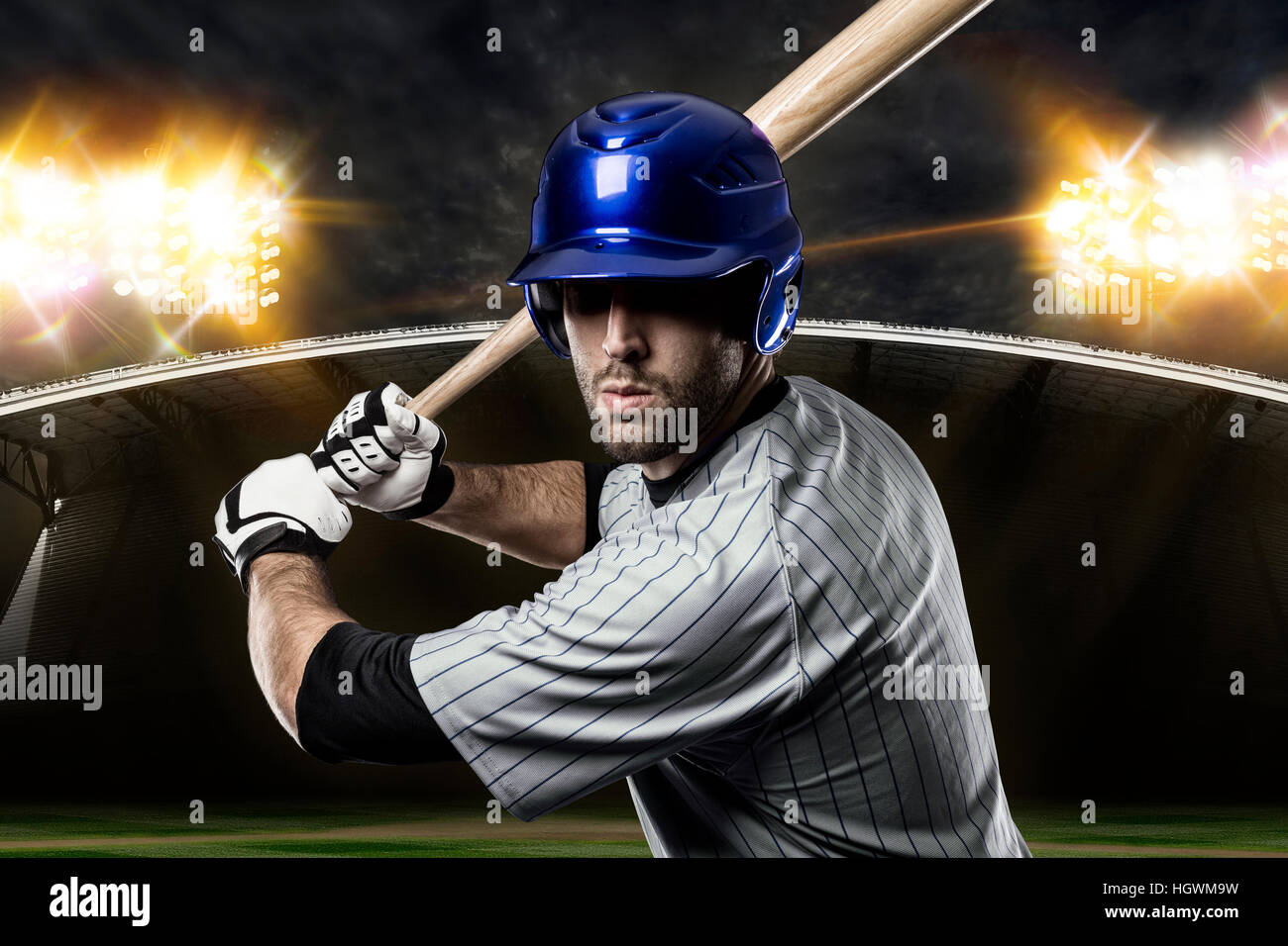 Baseball Player on a Blue Uniform on baseball Stadium Stock Photo - Alamy