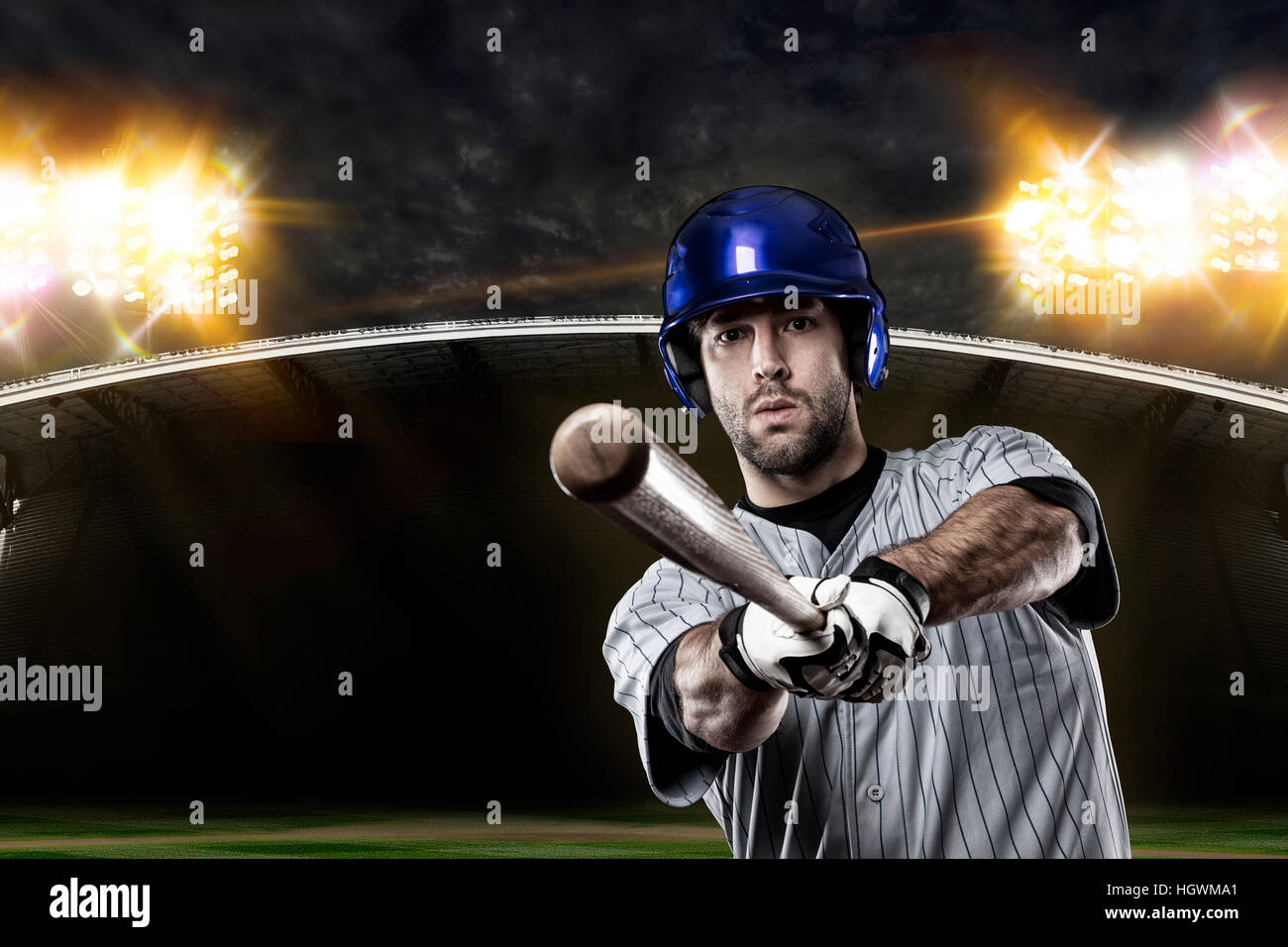 Baseball Player on a Blue Uniform on baseball Stadium Stock Photo - Alamy
