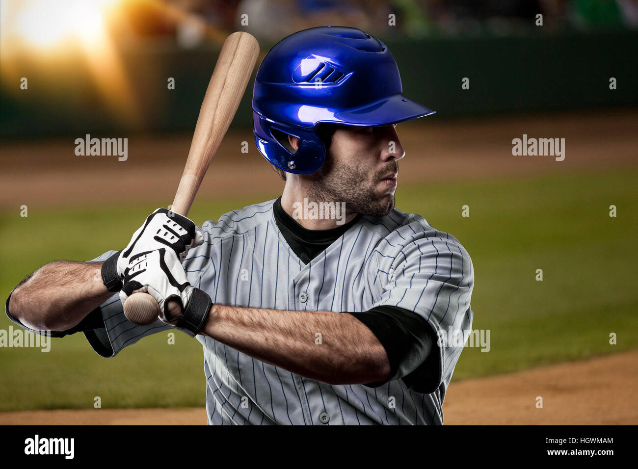 Baseball Player on a Blue Uniform on baseball Stadium Stock Photo - Alamy