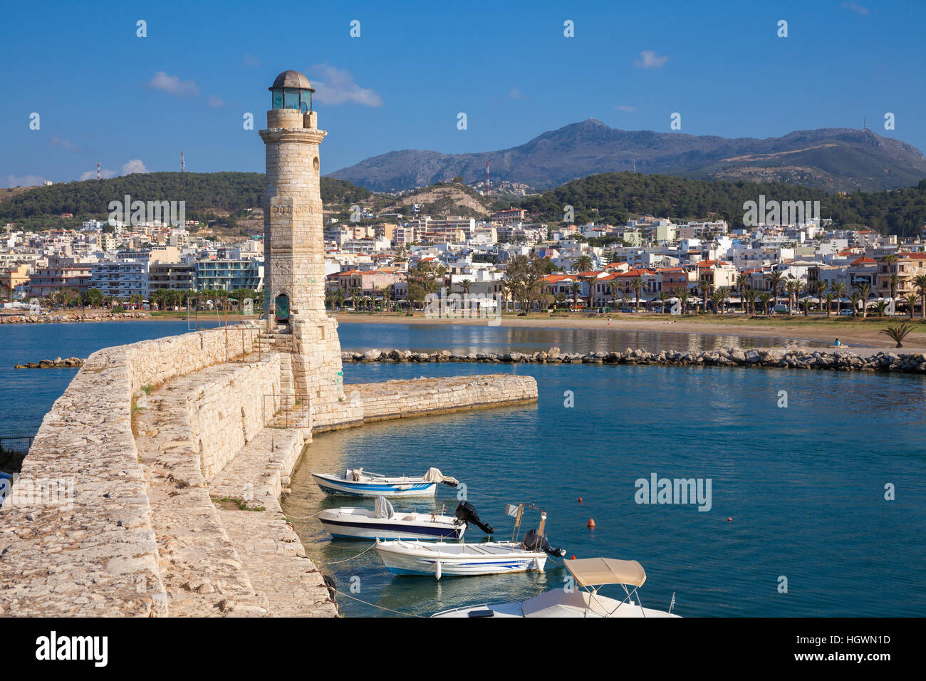 Venetian lighthouse and wall at old harbour in Rethymno (Rethymnon ...
