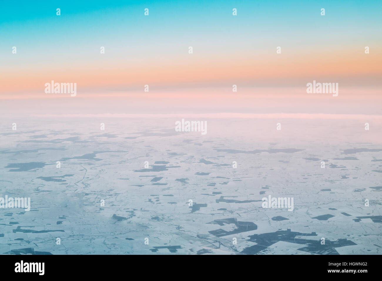 Aerial View From High Altitude Flight Of Aircraft On Snow-covered ...