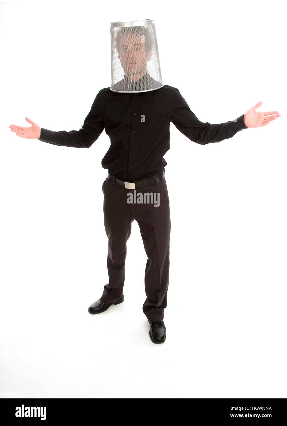 Business man with dustbin on head Stock Photo - Alamy