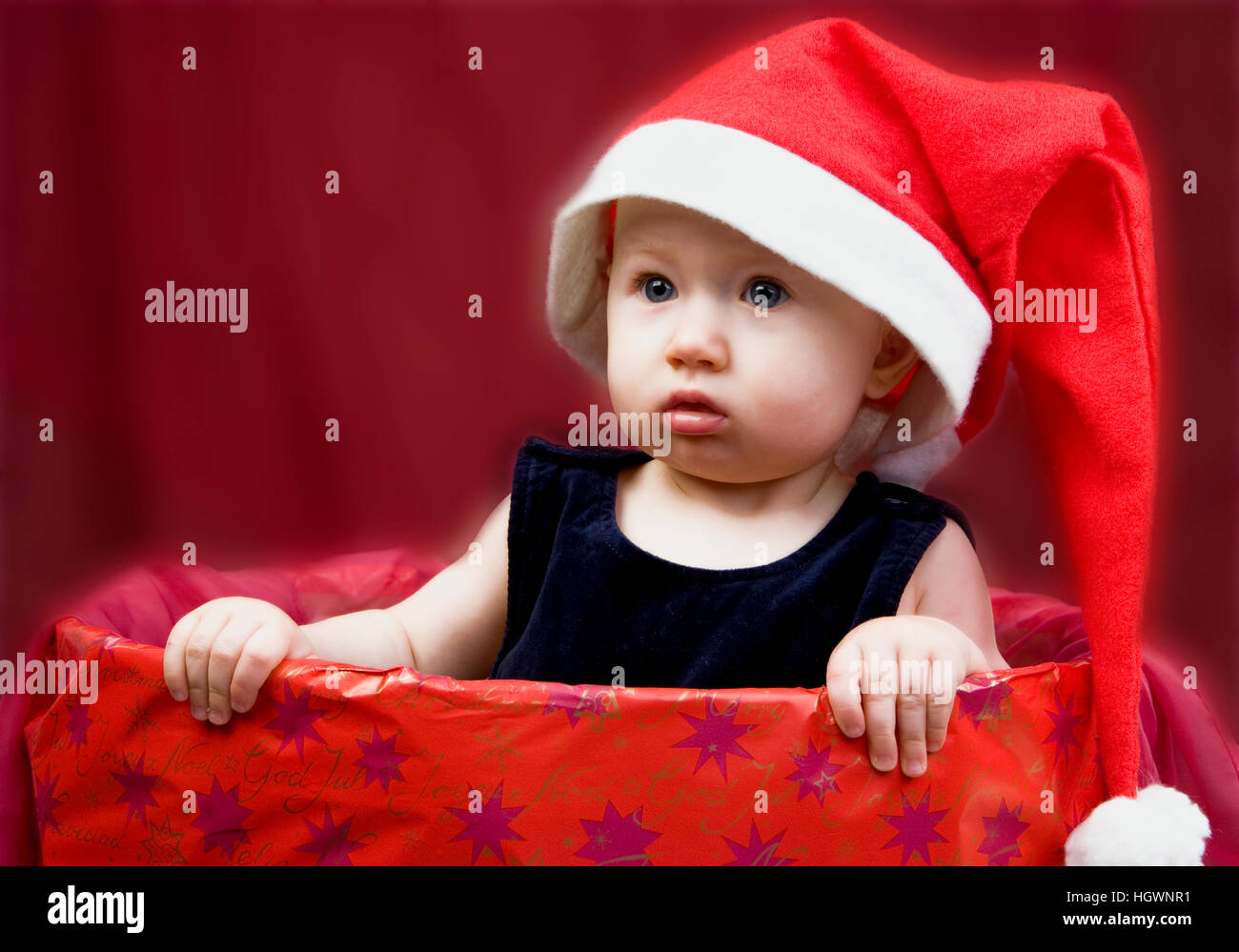Child with Santa hat Stock Photo - Alamy