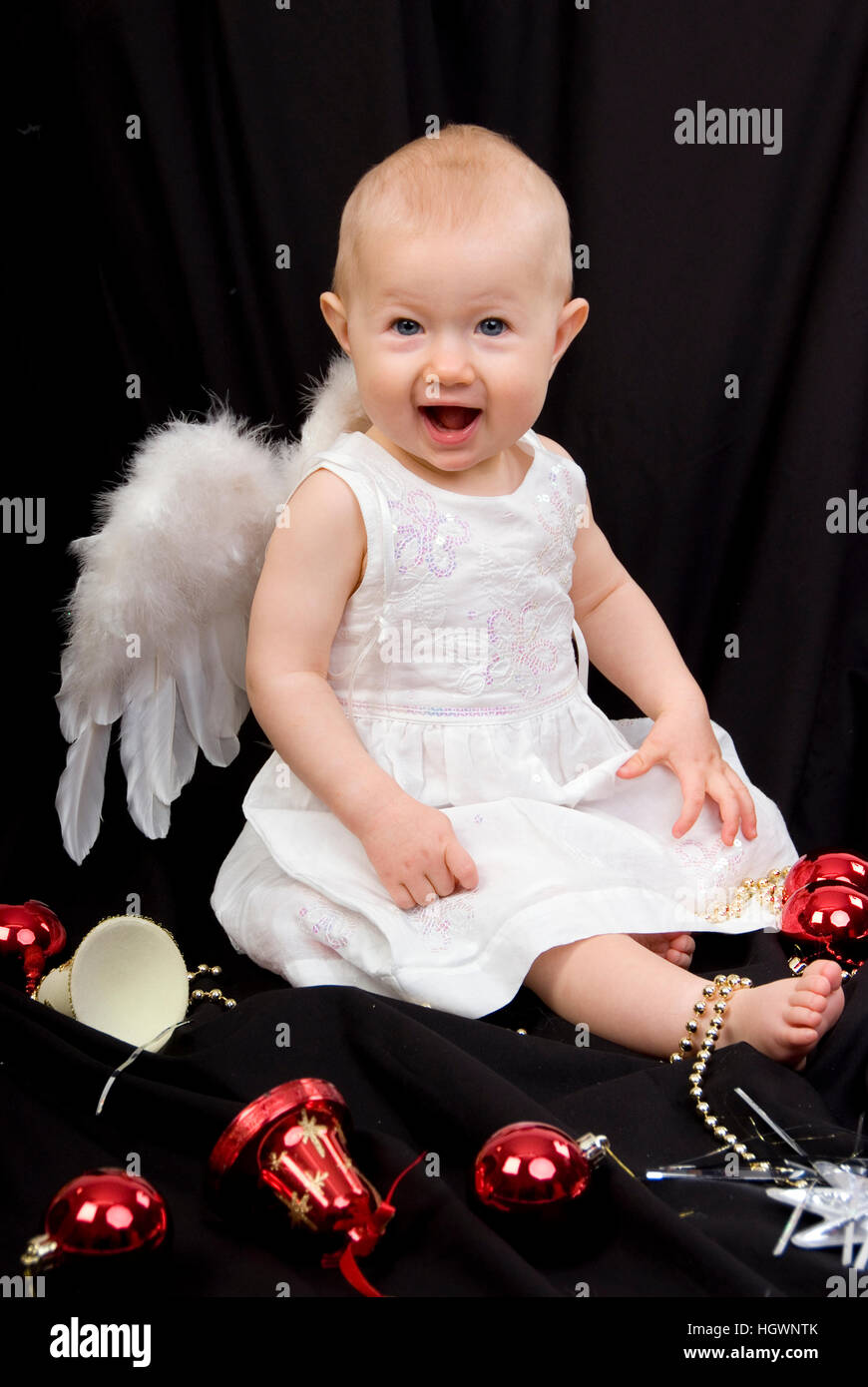 Child as a christmas angel Stock Photo - Alamy
