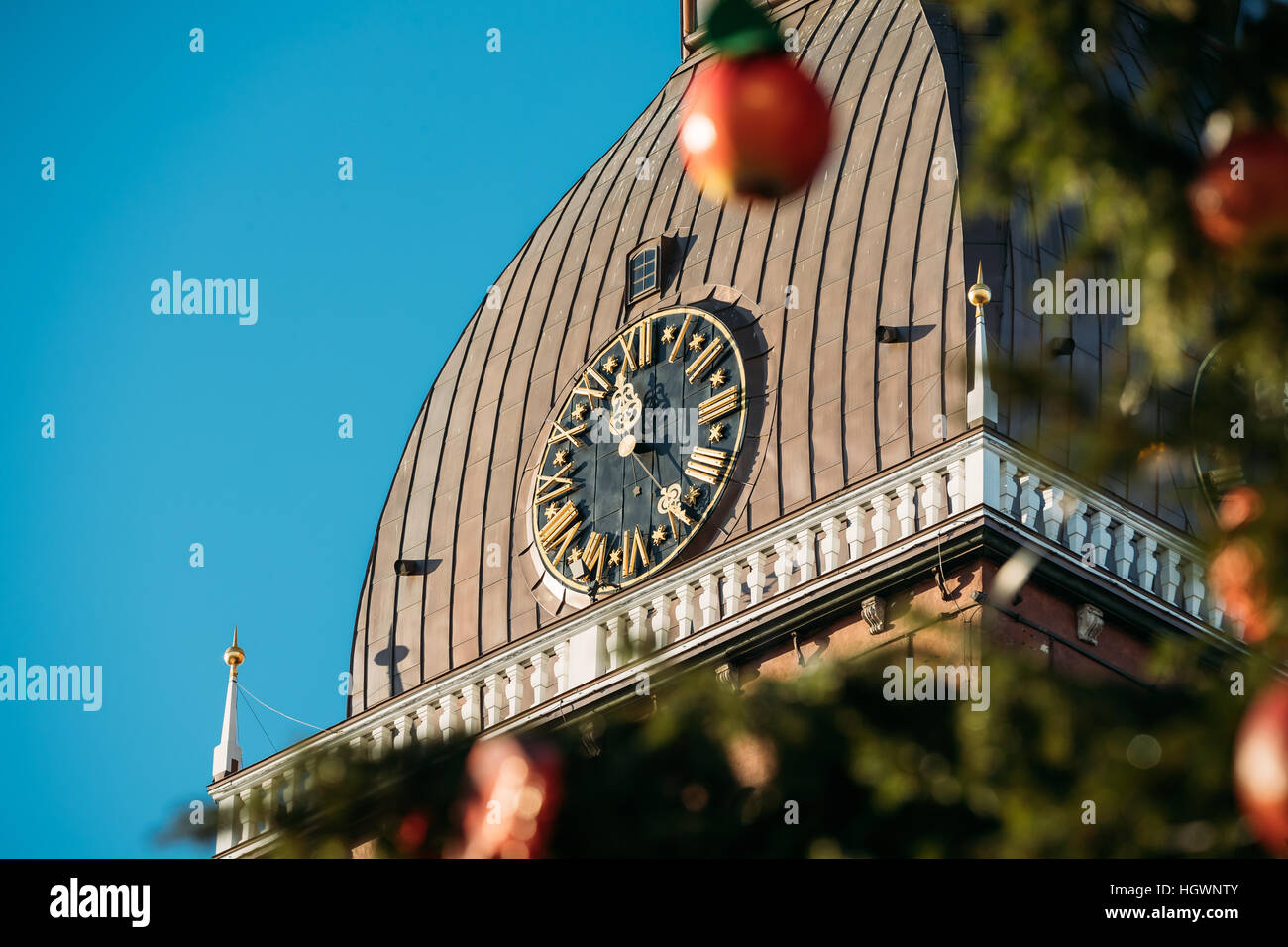 Close Up Of Clock On Tower Of Riga Dome Cathedral, Surrounded By ...