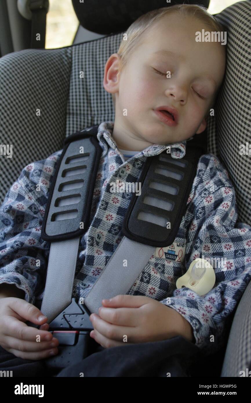 Little boy sleeping in seat Stock Photo - Alamy