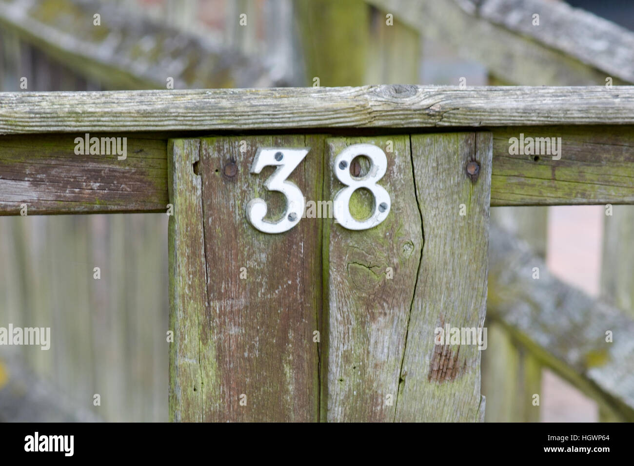 House Number 38 sign on gate Stock Photo - Alamy