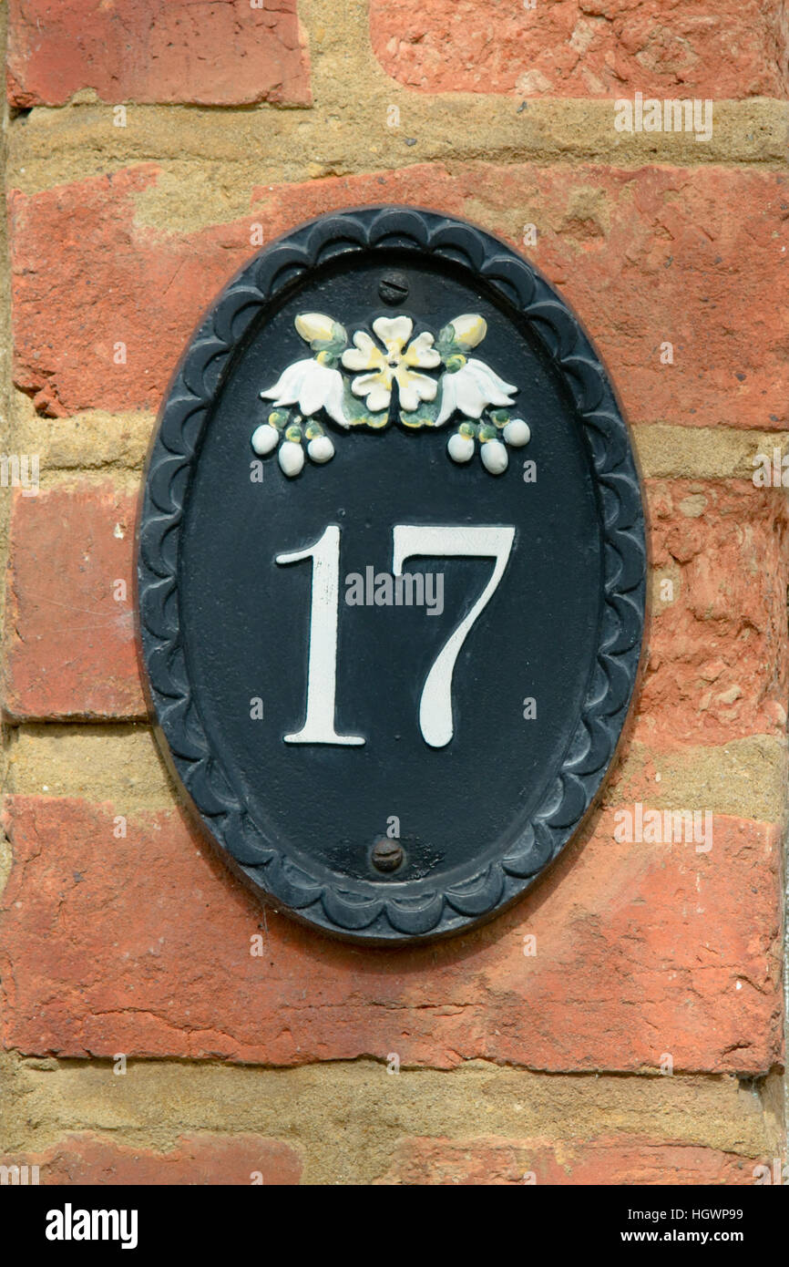 House number 17 sign on red brick wall Stock Photo - Alamy