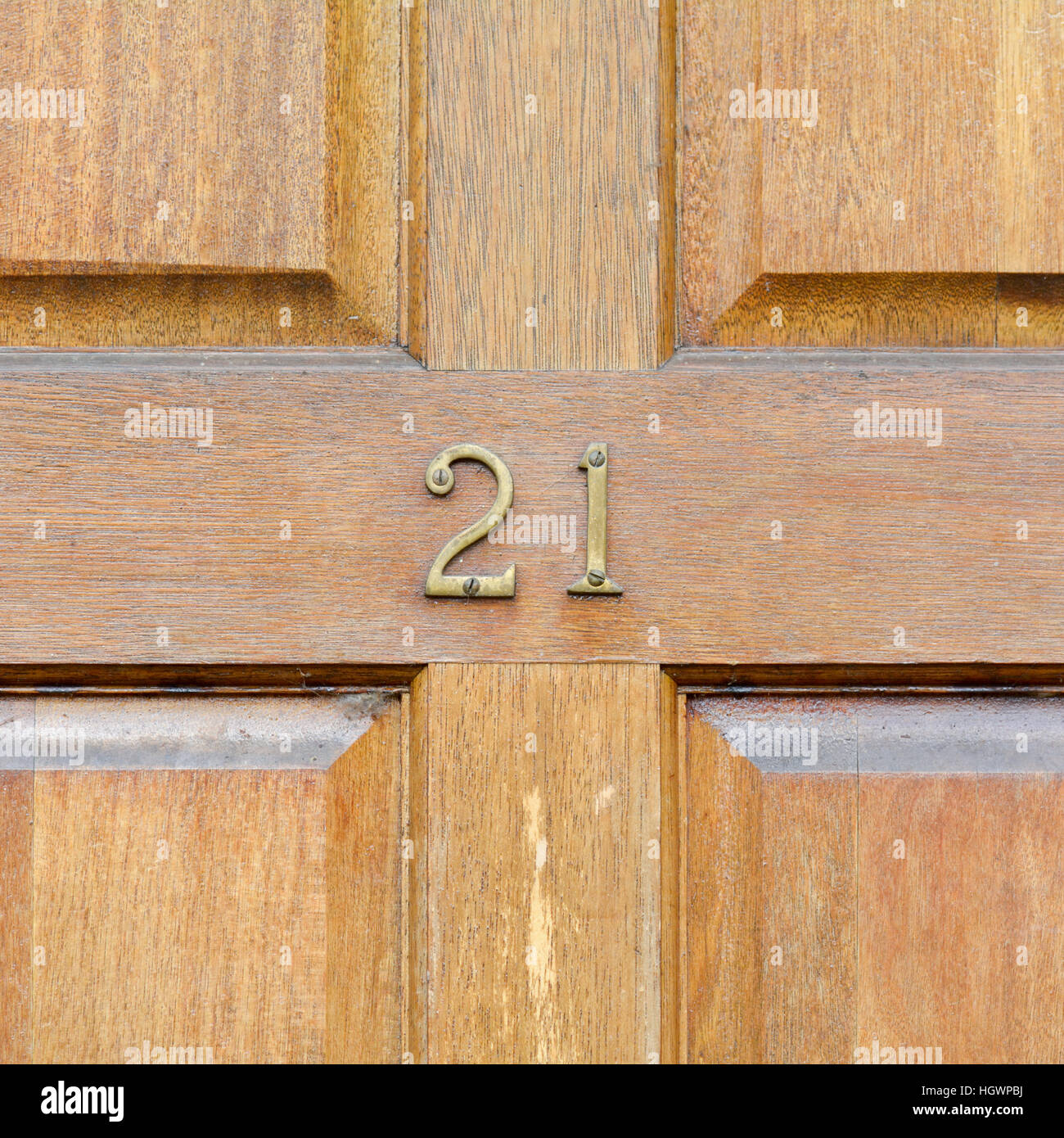House Number 21 sign on door Stock Photo - Alamy