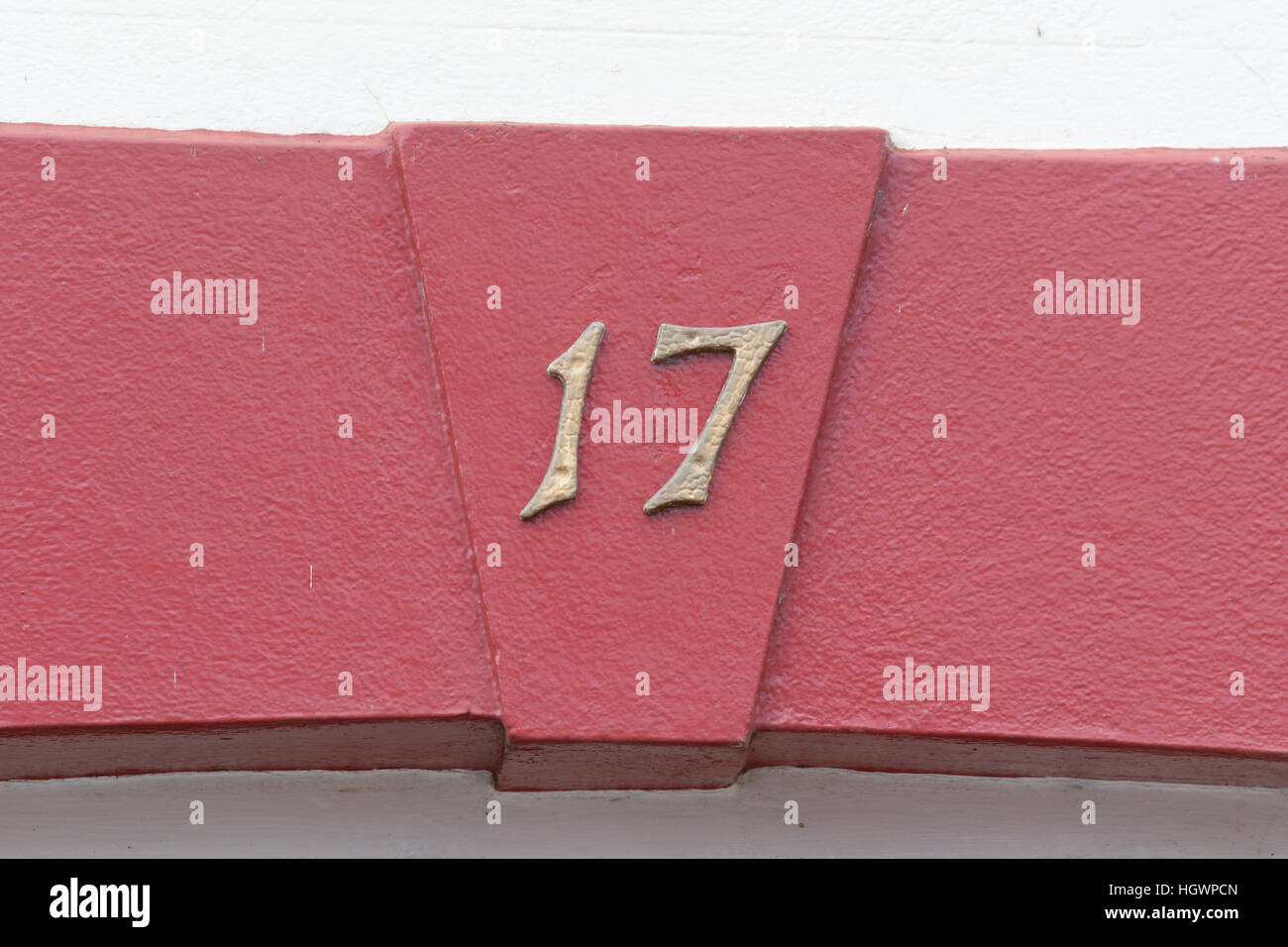 House Number 17 sign above door frame Stock Photo - Alamy