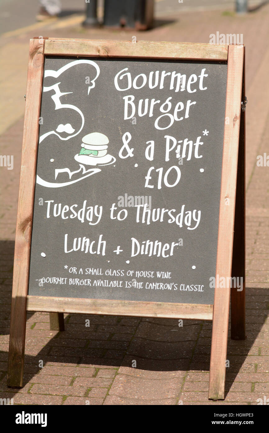 Gourmet burger and pint for £10 sign outside pub Stock Photo - Alamy
