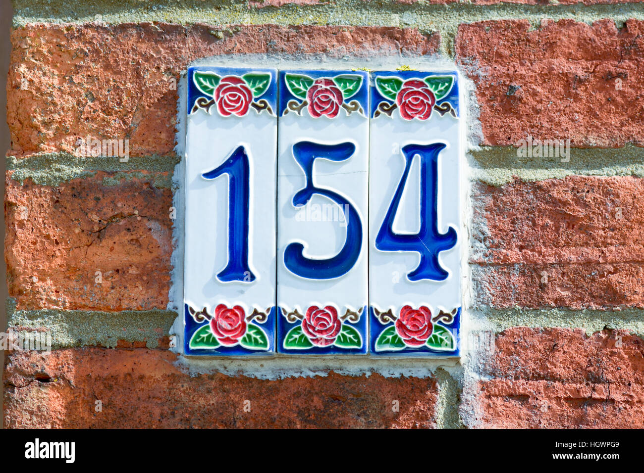 House Number 154 sign in colourful ceramic tiles Stock Photo - Alamy