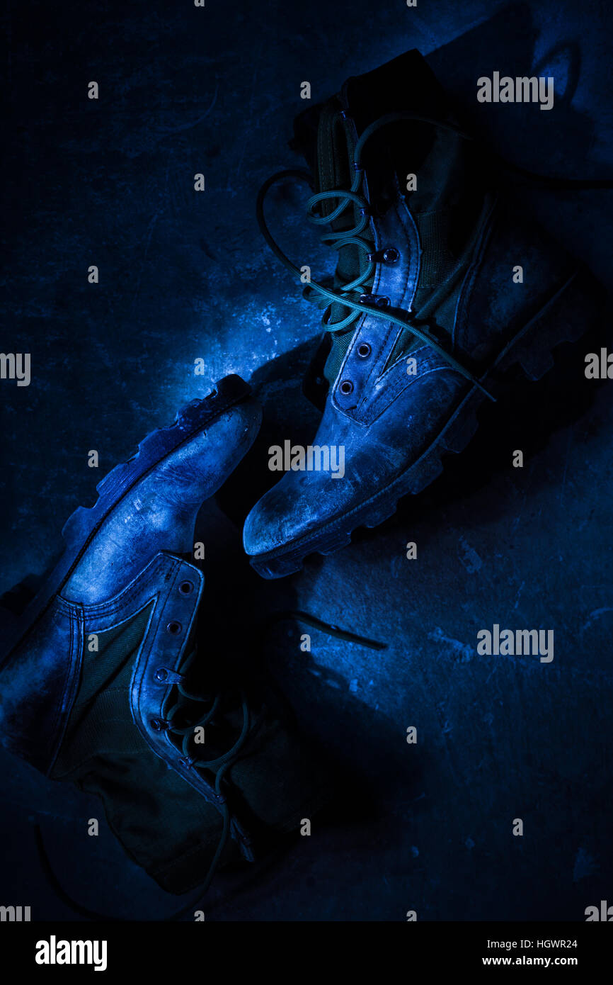 Dirty Heavy Duty Boots Laying on the Floor Stock Photo - Alamy
