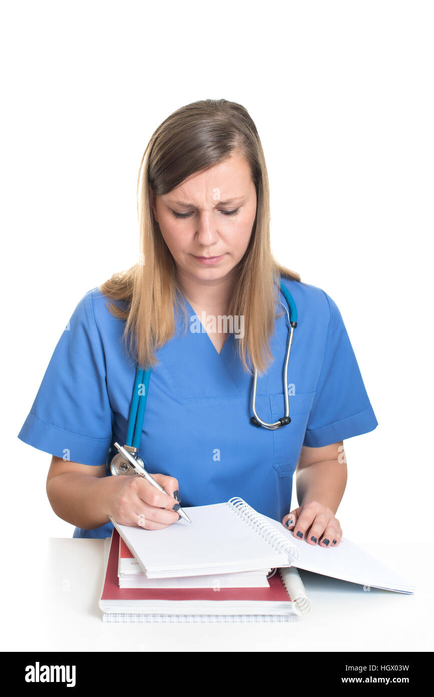 Female doctor studying hard books Stock Photo - Alamy
