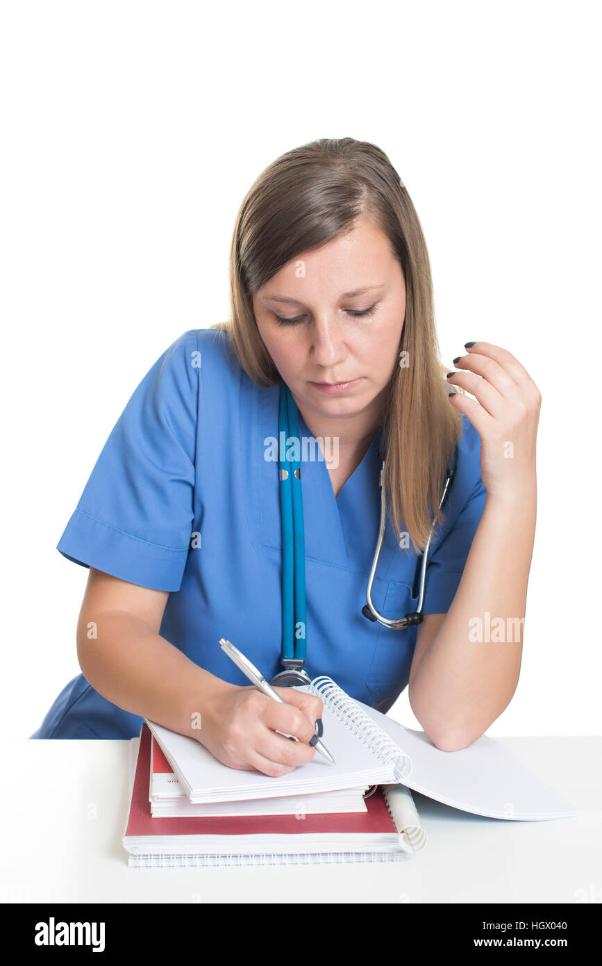 Female doctor studying hard books Stock Photo - Alamy