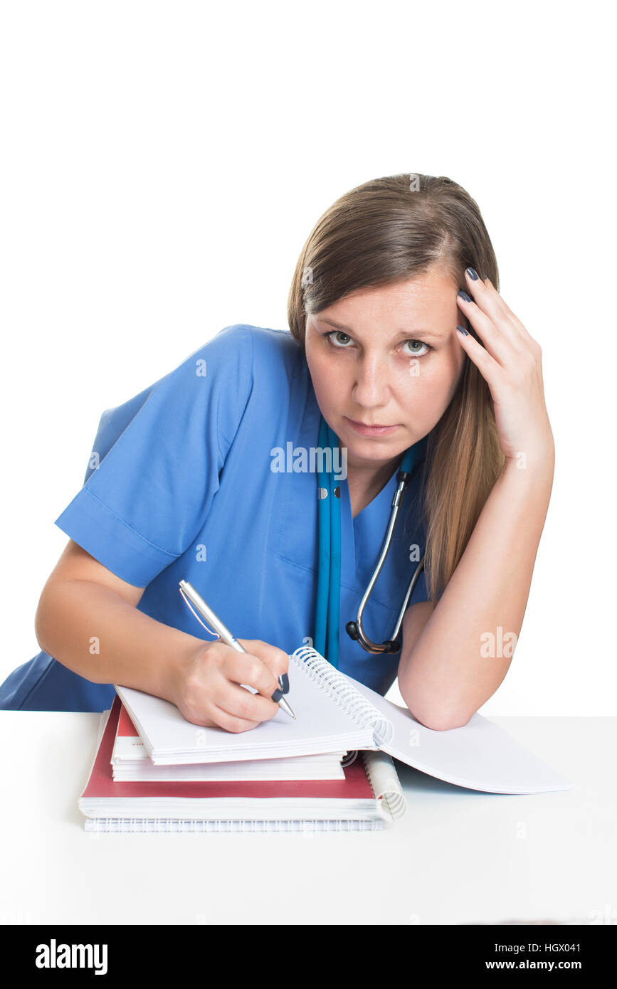 Female doctor studying hard books Stock Photo - Alamy
