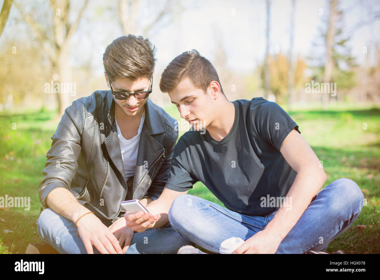 Friends receiving bad news Stock Photo - Alamy
