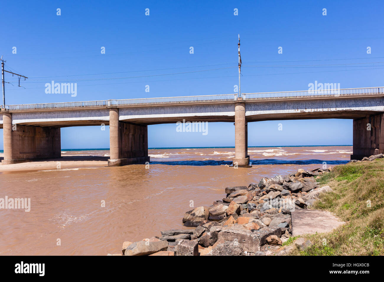 Coastal beach bridge for trains and vehicles crossings over river ...
