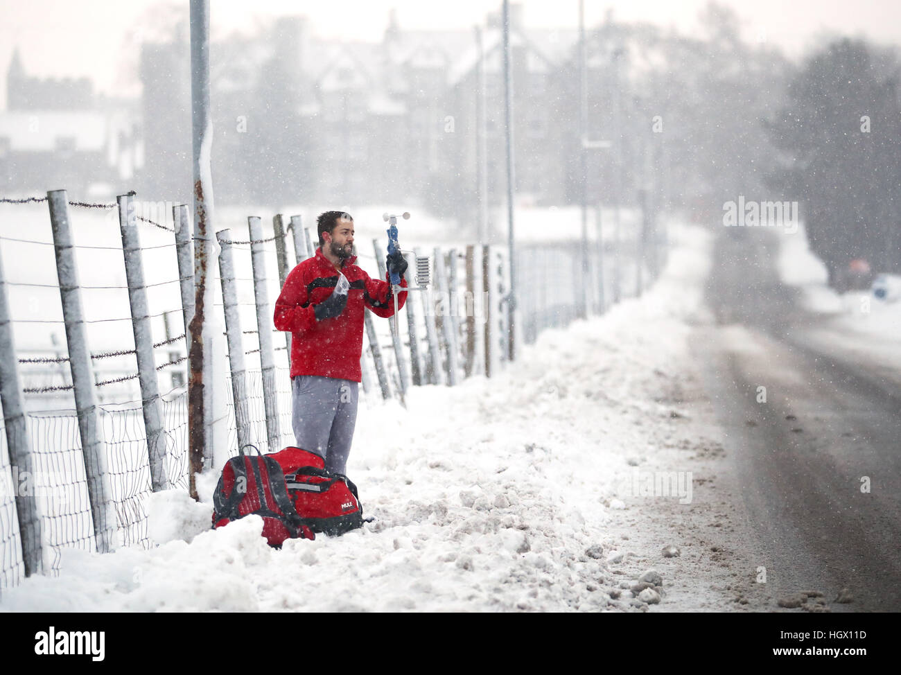 Meteorologist Tom Lavery takes measurements for the Met Office in ...