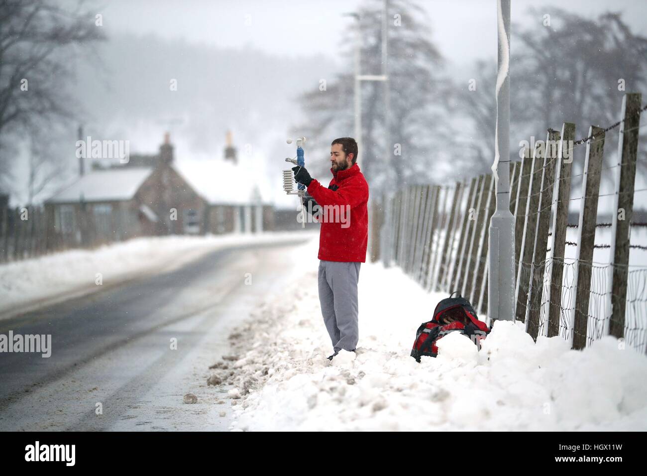 Meteorologist Tom Lavery takes measurements for the Met Office in ...