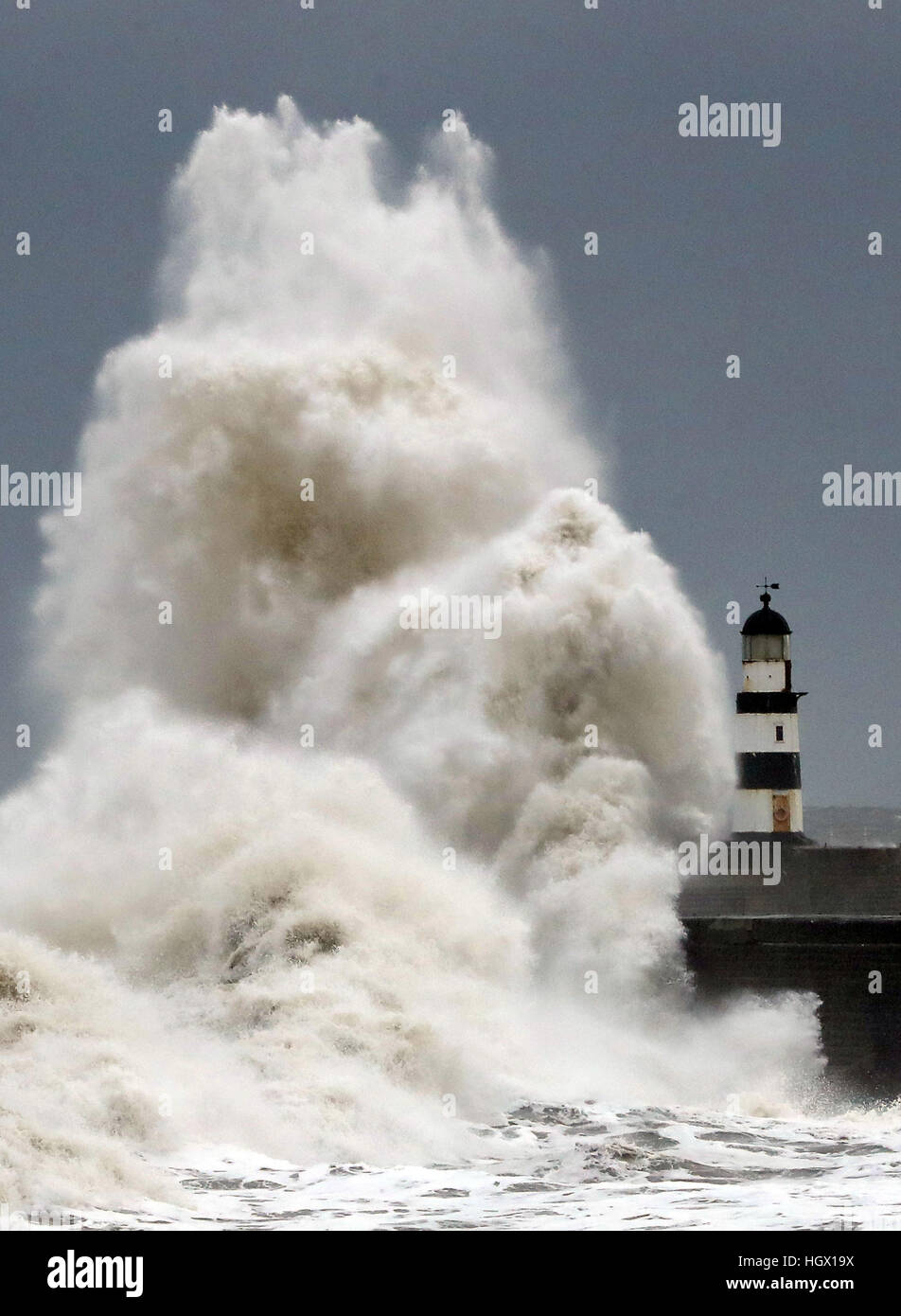 Waves crash into the sea wall at Seaham Harbour as Scotland and the ...