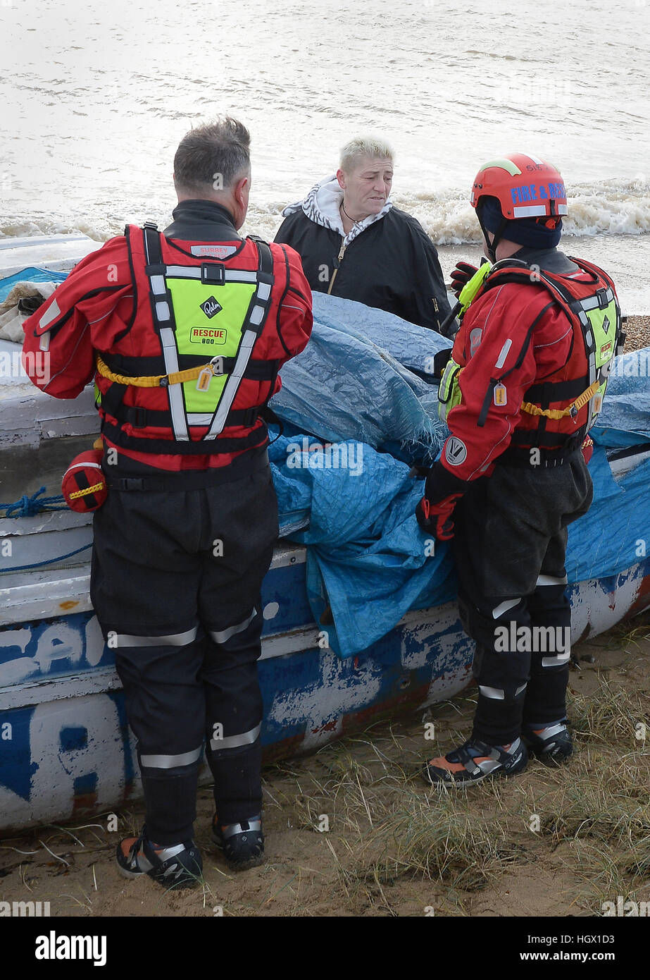 Sarah Stott talking to the Fire Rescue Service on Jaywick beach, Essex ...