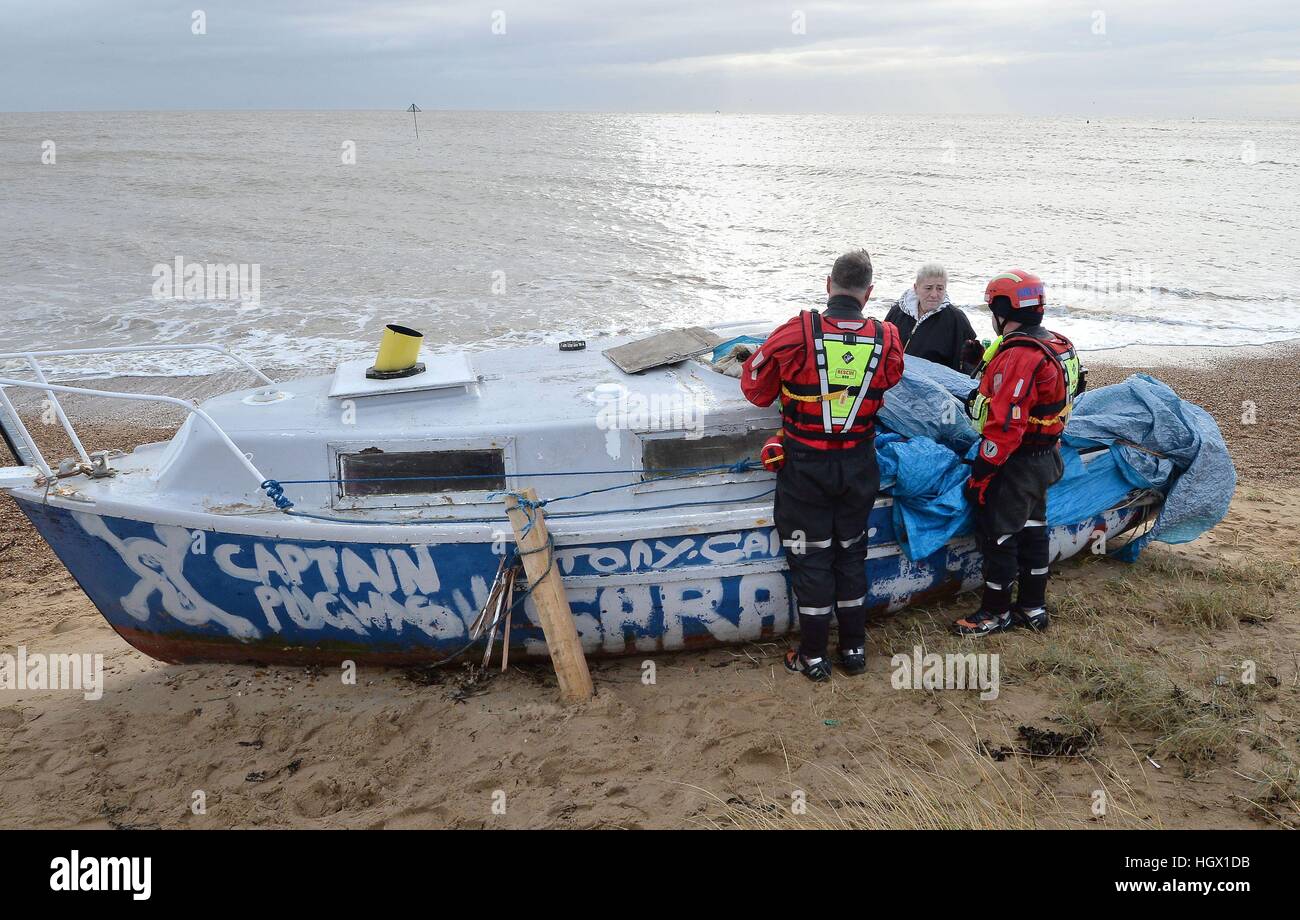 Sarah Stott talking to the Fire Rescue Service on Jaywick beach, Essex ...