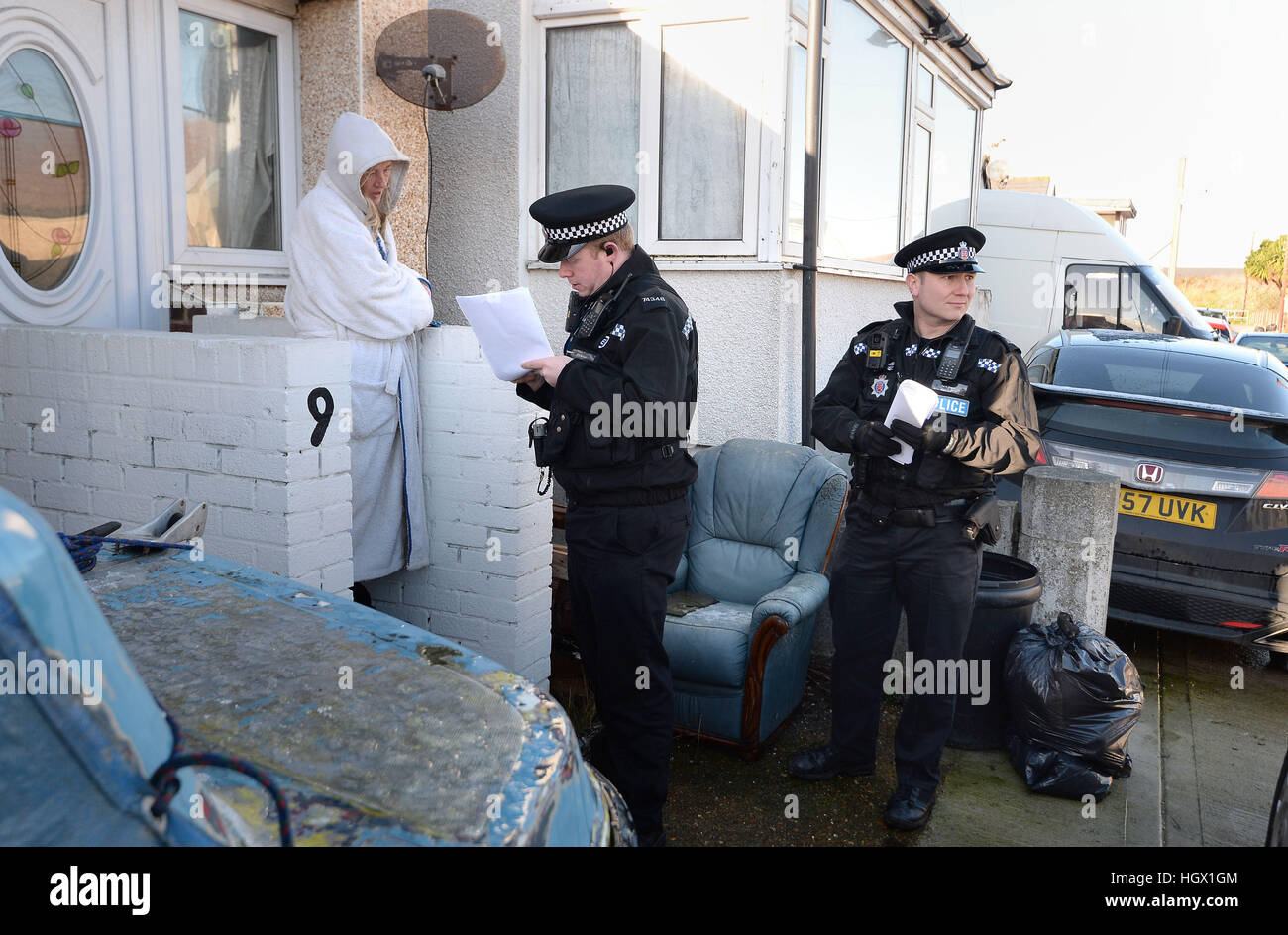 Police officers telling local residents in Jaywick, Essex about the ...