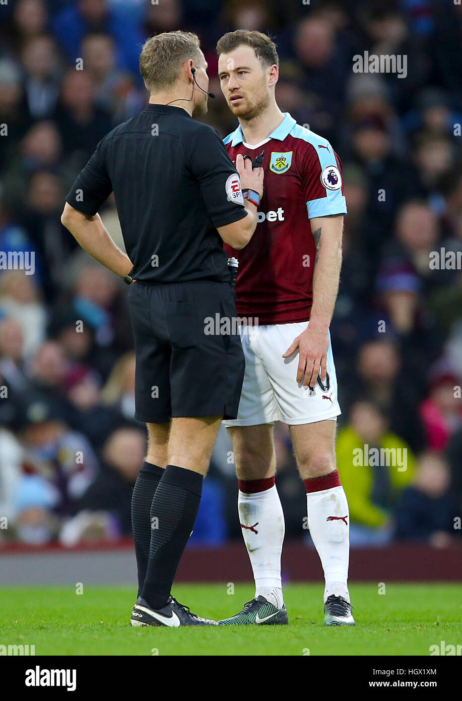 Burnley's Ashley Barnes speaks with referee Graham Scott Stock Photo ...