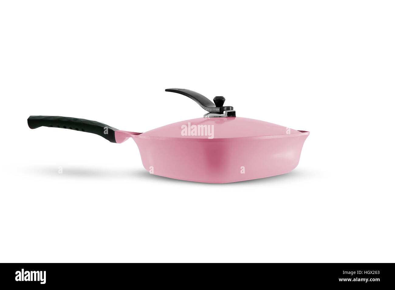 pink frying pan on a white background Stock Photo - Alamy