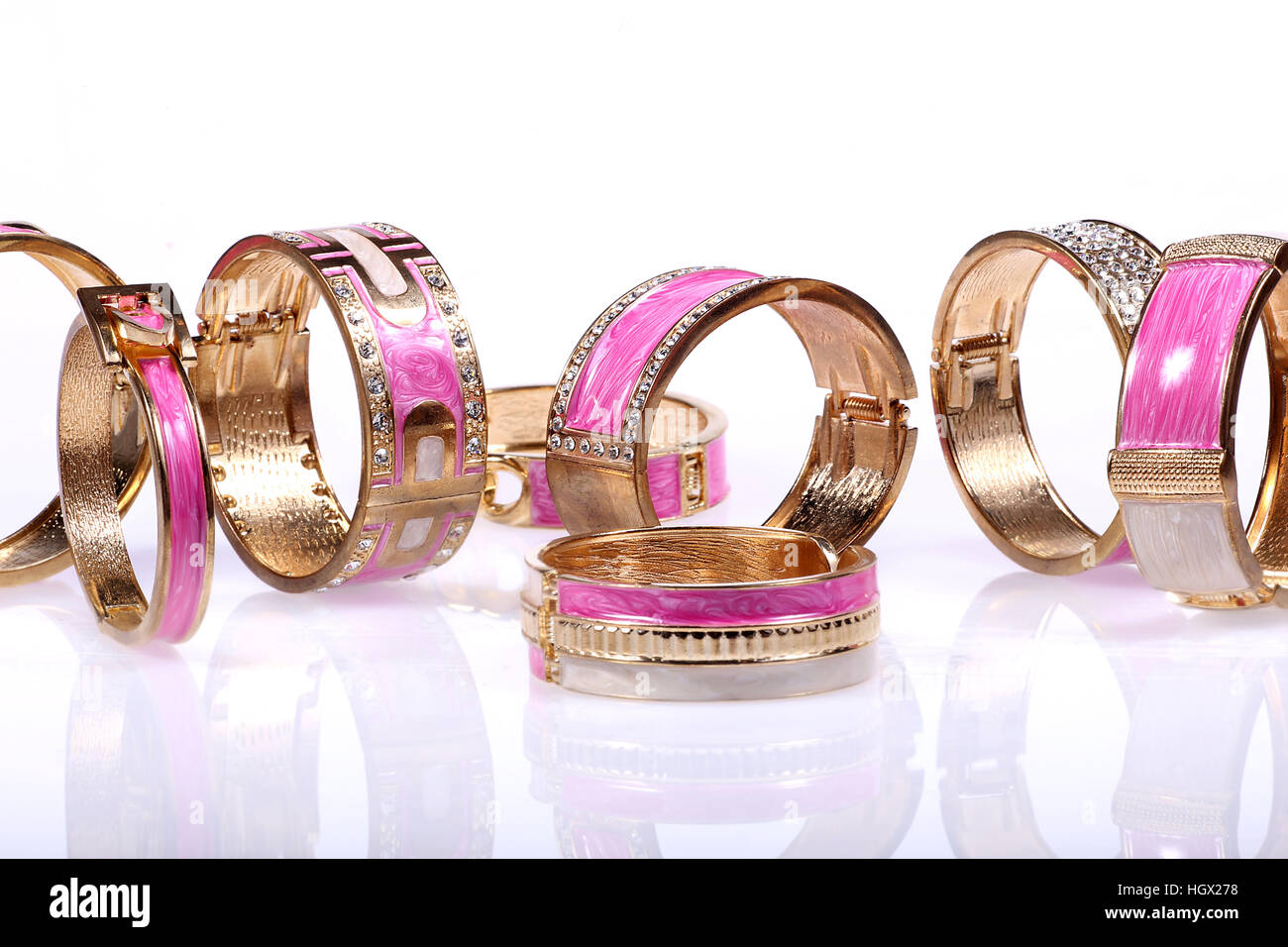 bangles and ring on a white background Stock Photo - Alamy