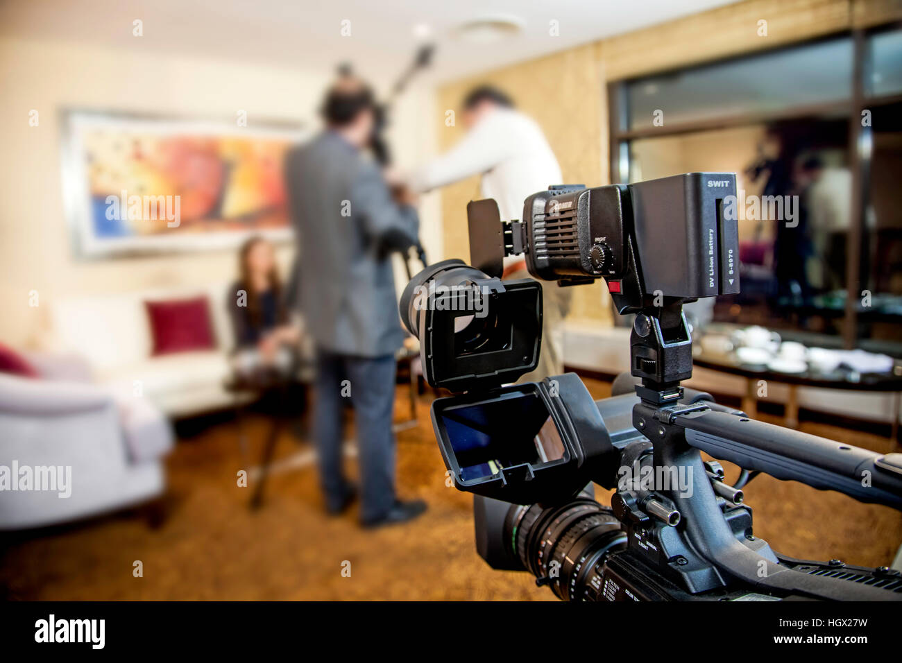 video camera on a blur background Stock Photo - Alamy