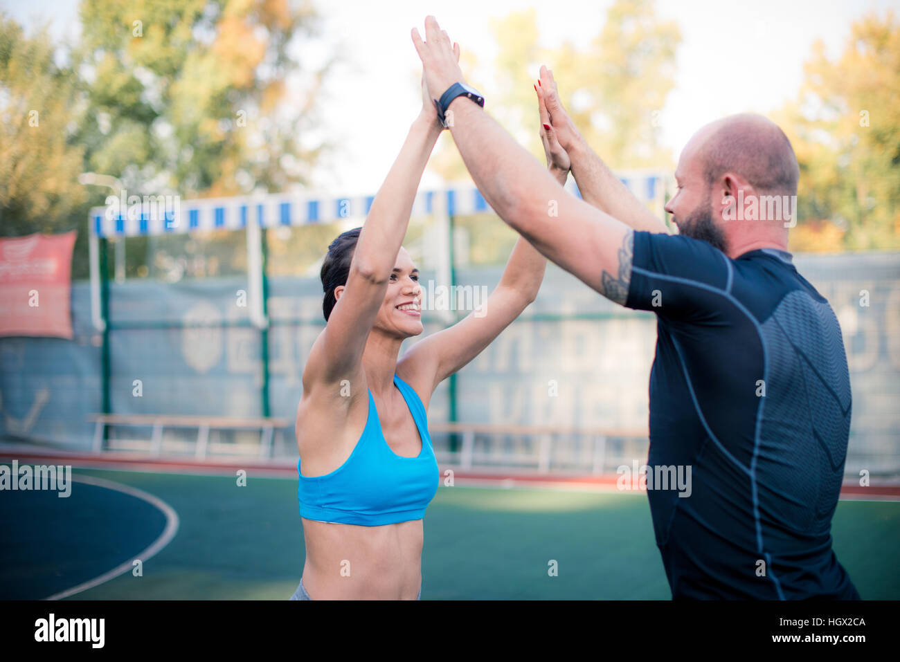 High five hands two hands giving a high five hi-res stock photography ...