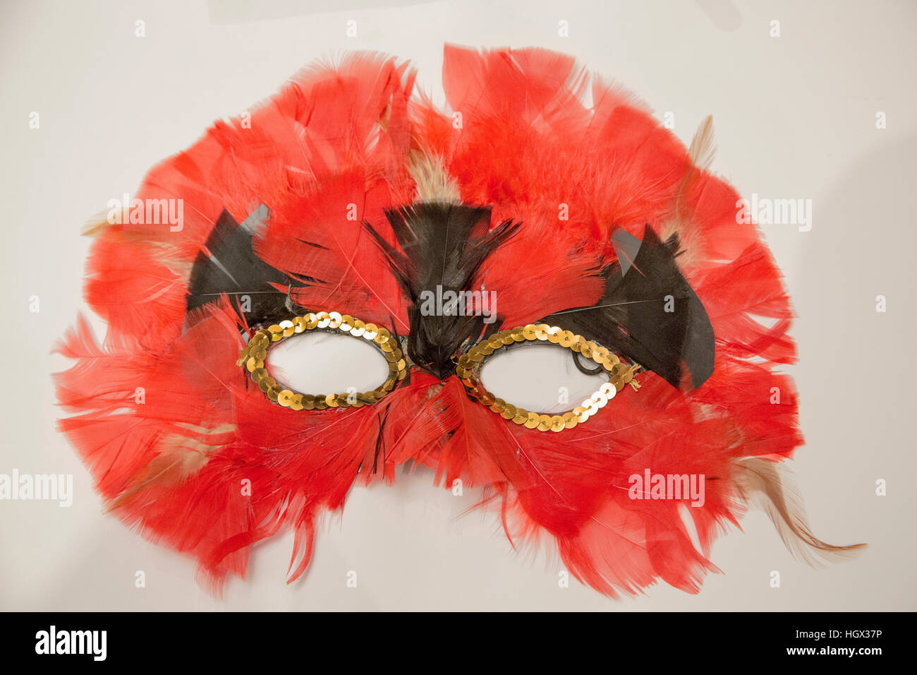 Feather Mask - Orange Stock Photo - Alamy