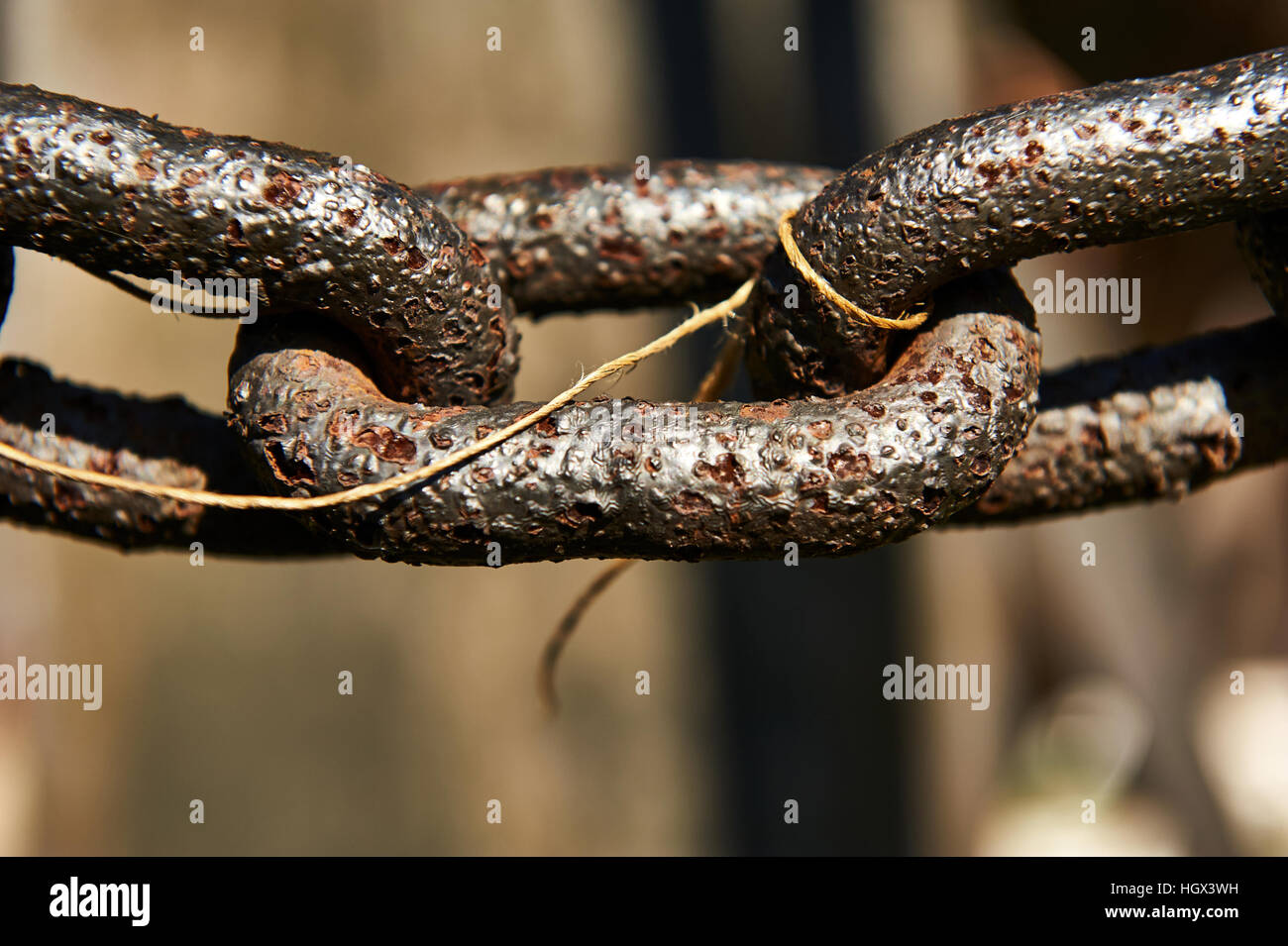 Rusty links in the chain Stock Photo - Alamy