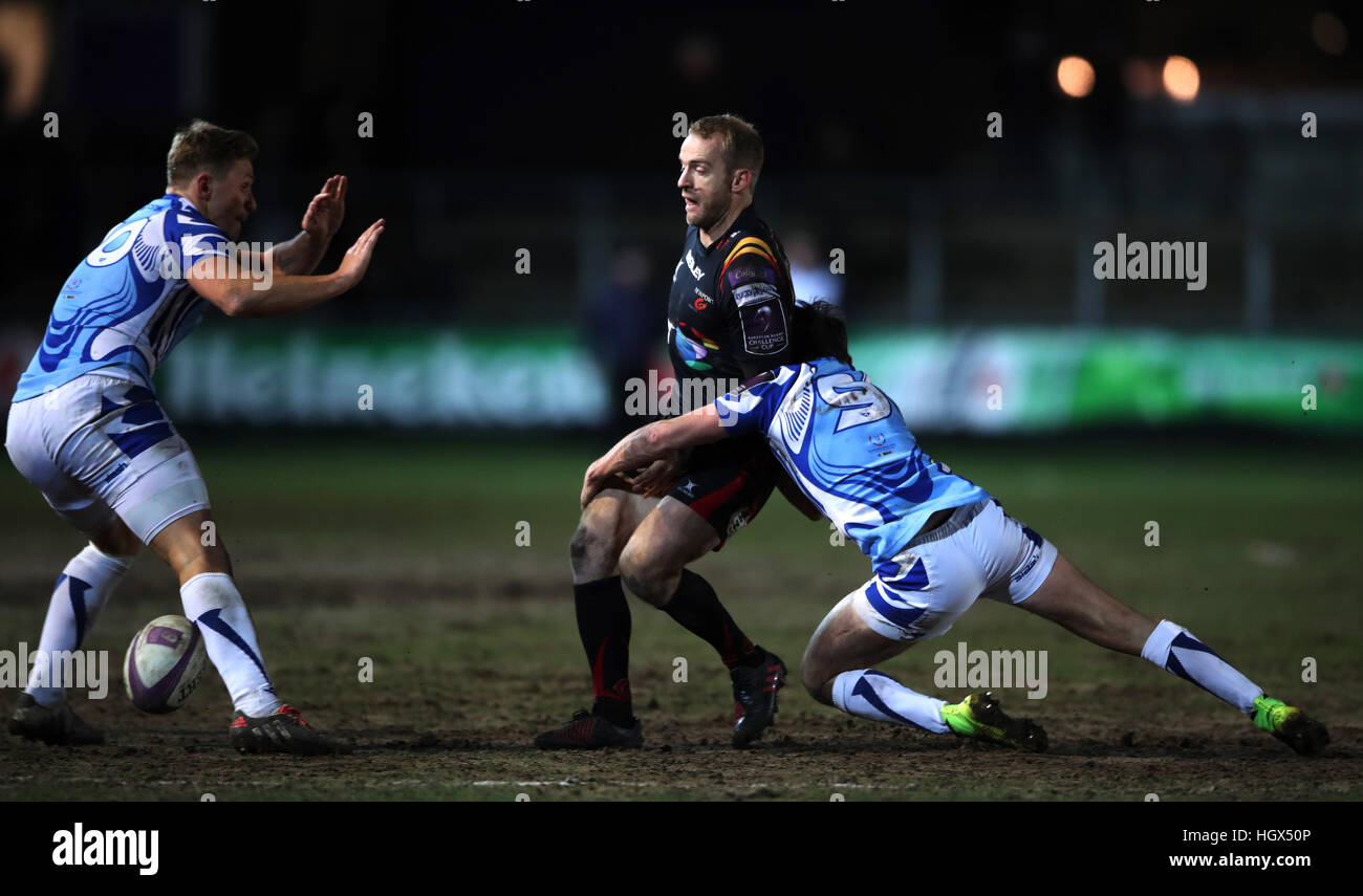Newport Gwent Dragons' Sarel Pretorius plays a grubber kick as he is ...