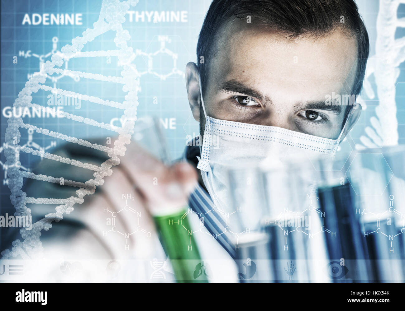 Portrait of concentrated male scientist working with reagents in ...