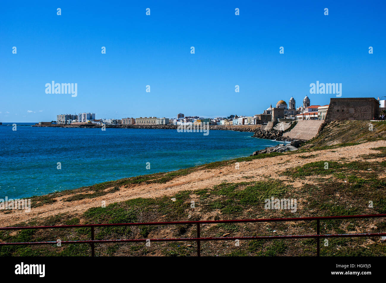 Coast Cadiz Bay with sea and blue sky. In the distance one sees the ...