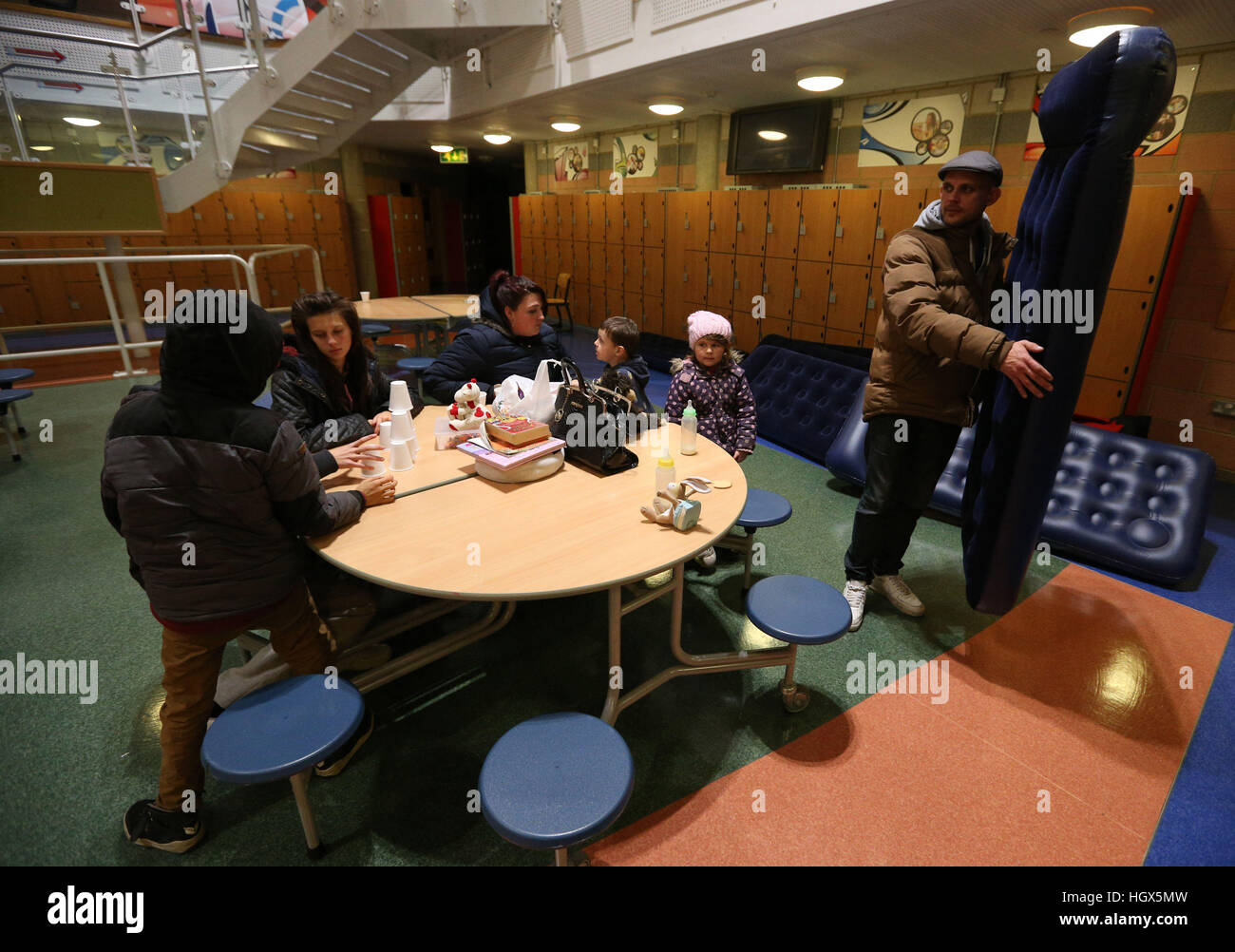 Gavin Mack (right) from St Osyth, prepares to bed down with his family ...