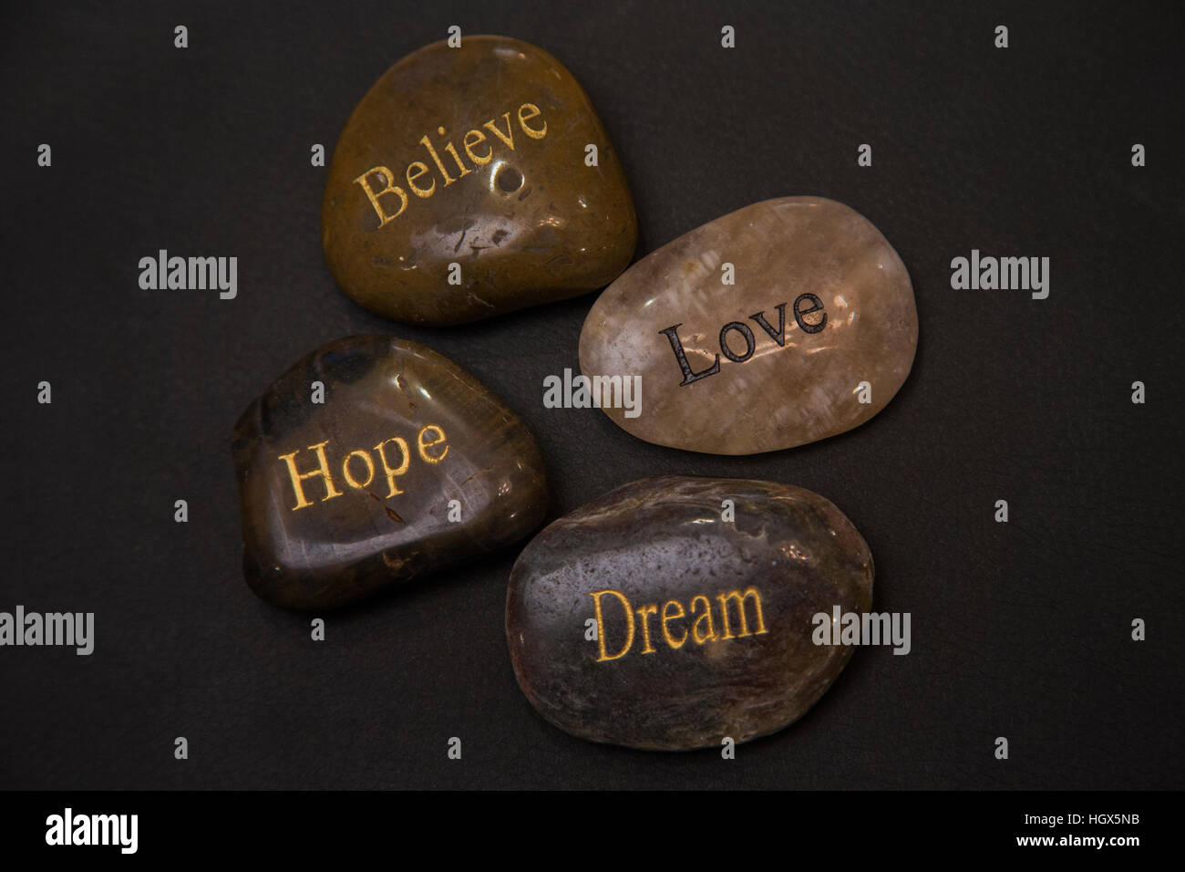 Inspiration stones with words Stock Photo - Alamy